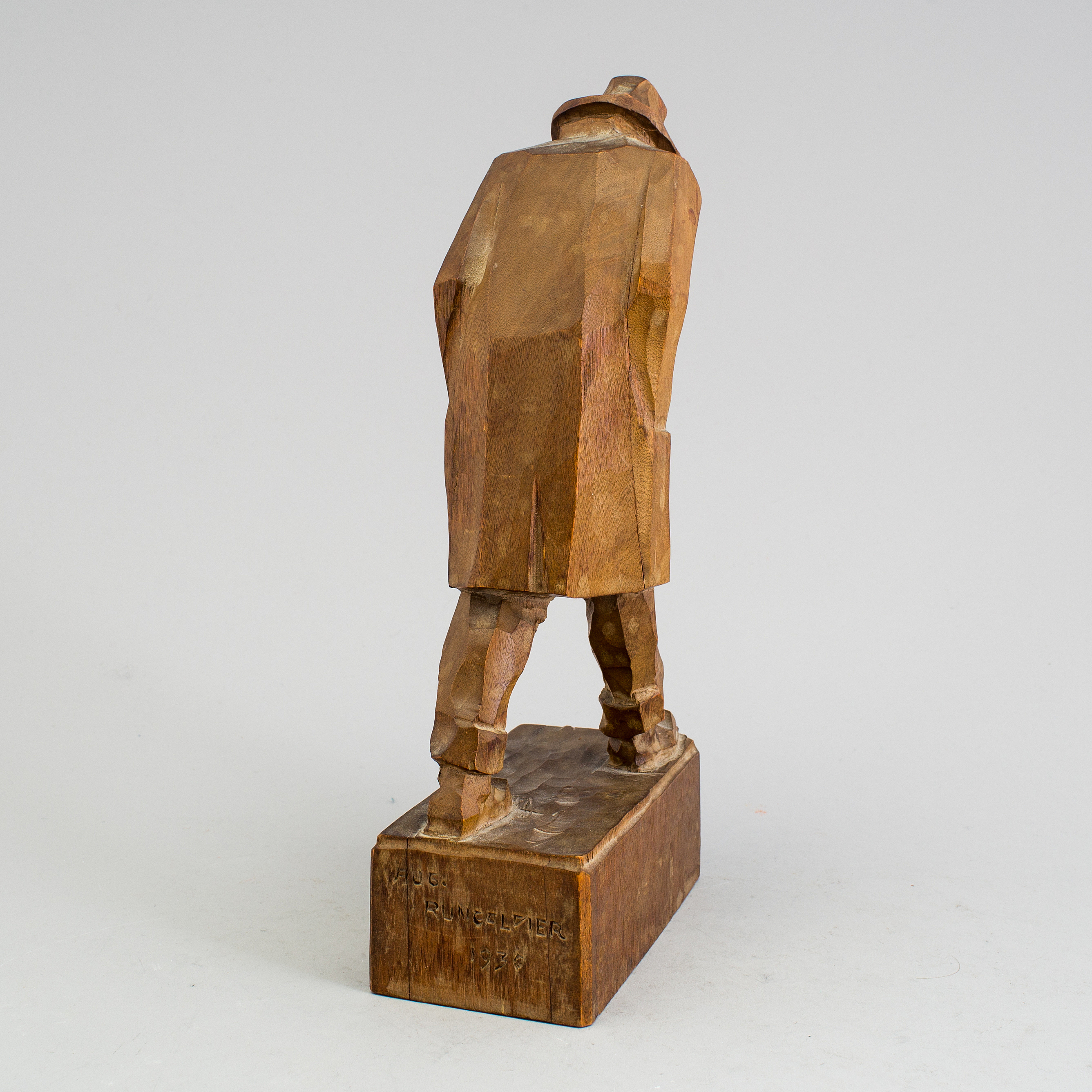 A wooden sculpture signed Aug. Rungaldier 1939. - Bukowskis