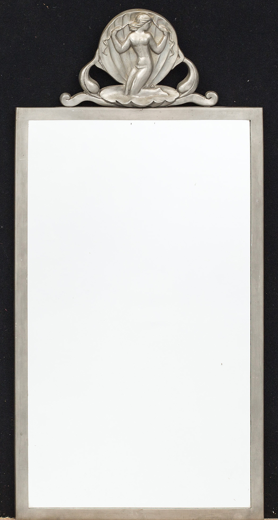 A SWEDISH GRACE MIRROR FORM YSTAD TENN, 1931. - Bukowskis