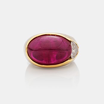 A circa 12.60ct ct cabochon cut ruby and a circa 0.91 ct trilliant cut ...