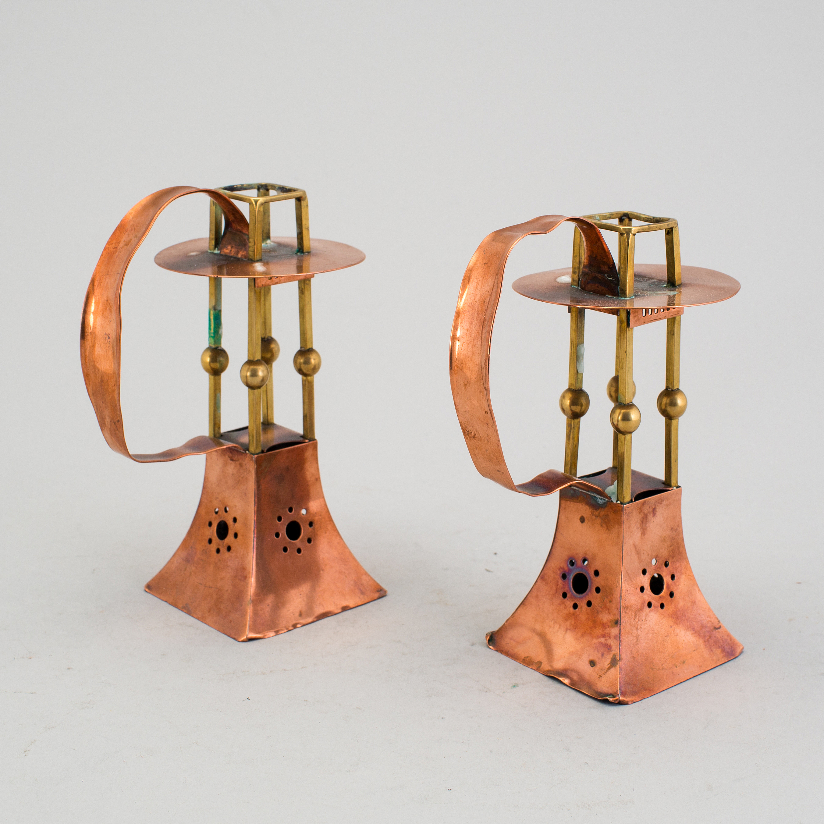 Pair of Art Nouveau brass and copper candlesticks by Carl Deffner ...