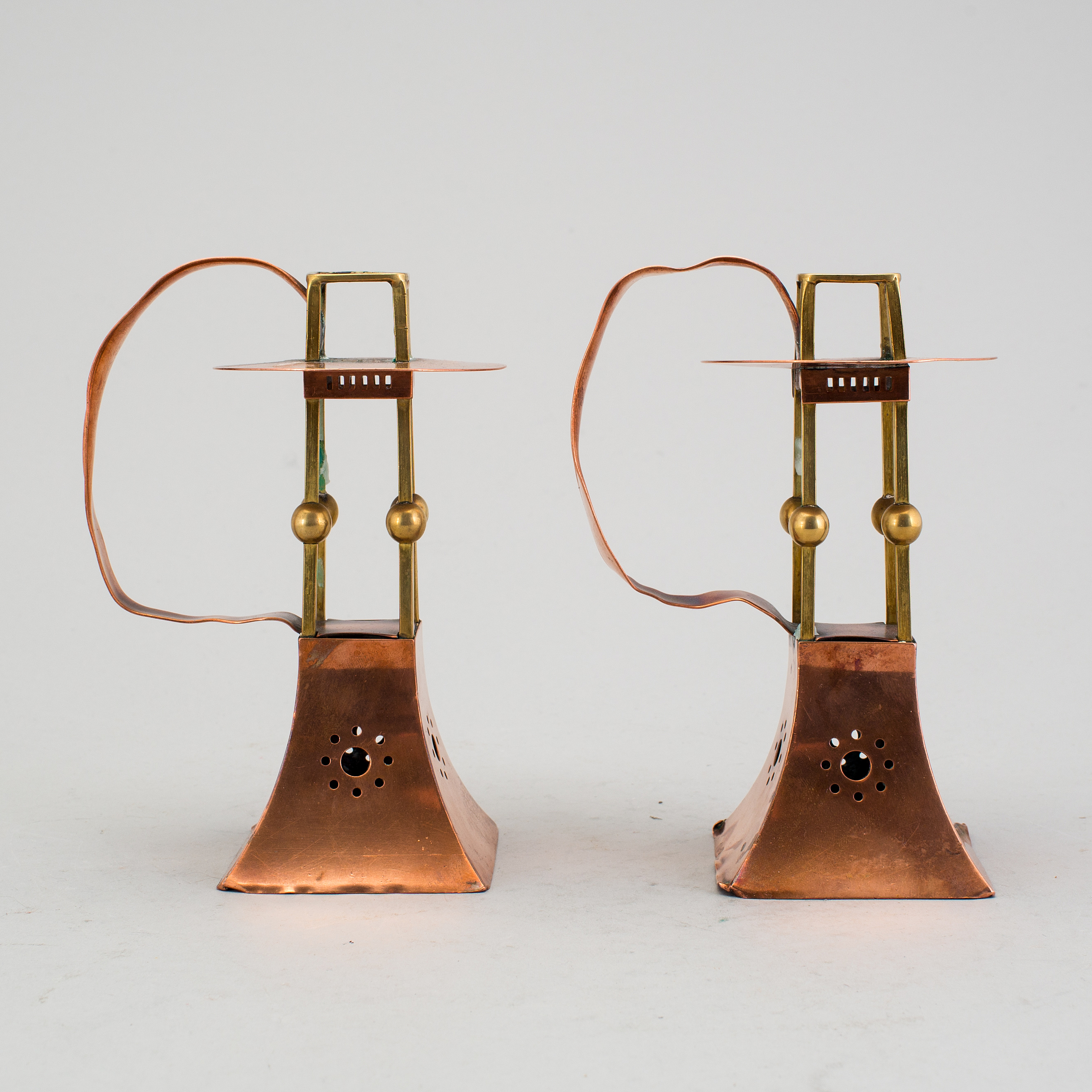 Pair of Art Nouveau brass and copper candlesticks by Carl Deffner ...