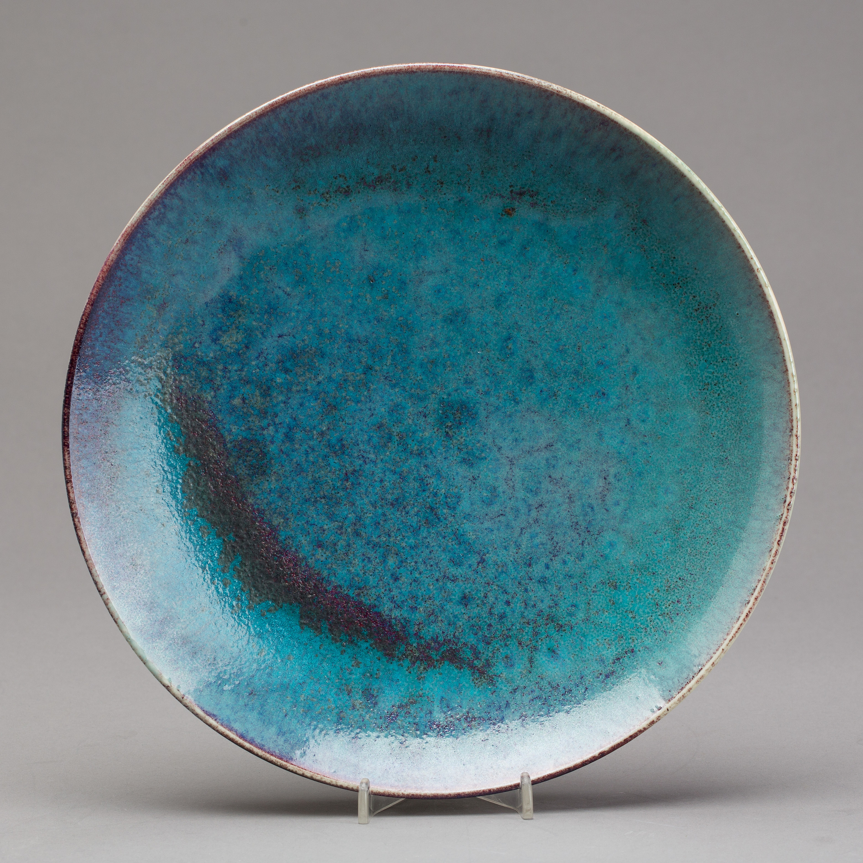 TOINI MUONA, a signed stoneware plate. - Bukowskis