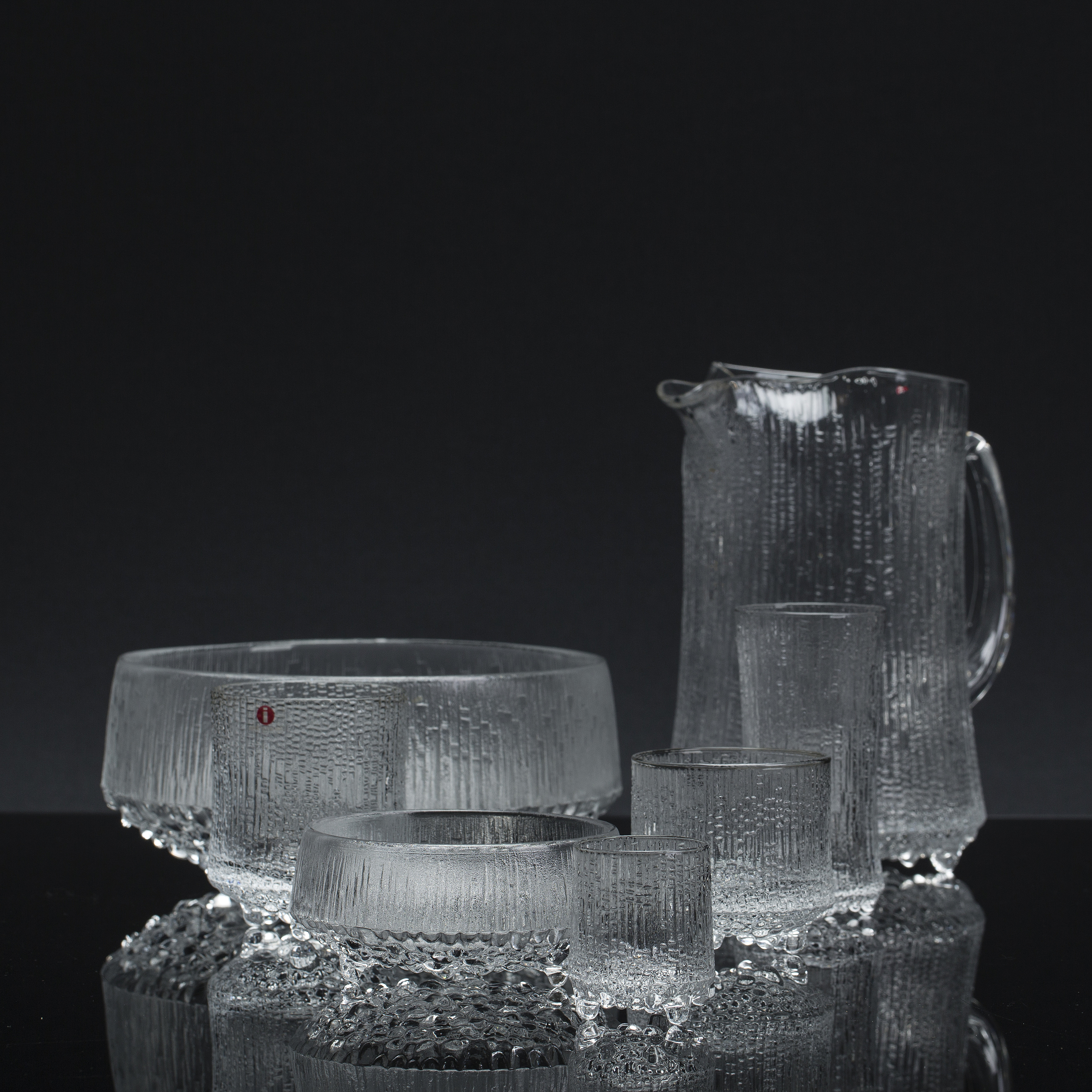 A SET OF 43 PIECES "ULTIMA THULE" GLASS SERVICE DESIGNED BY TAPIO ...