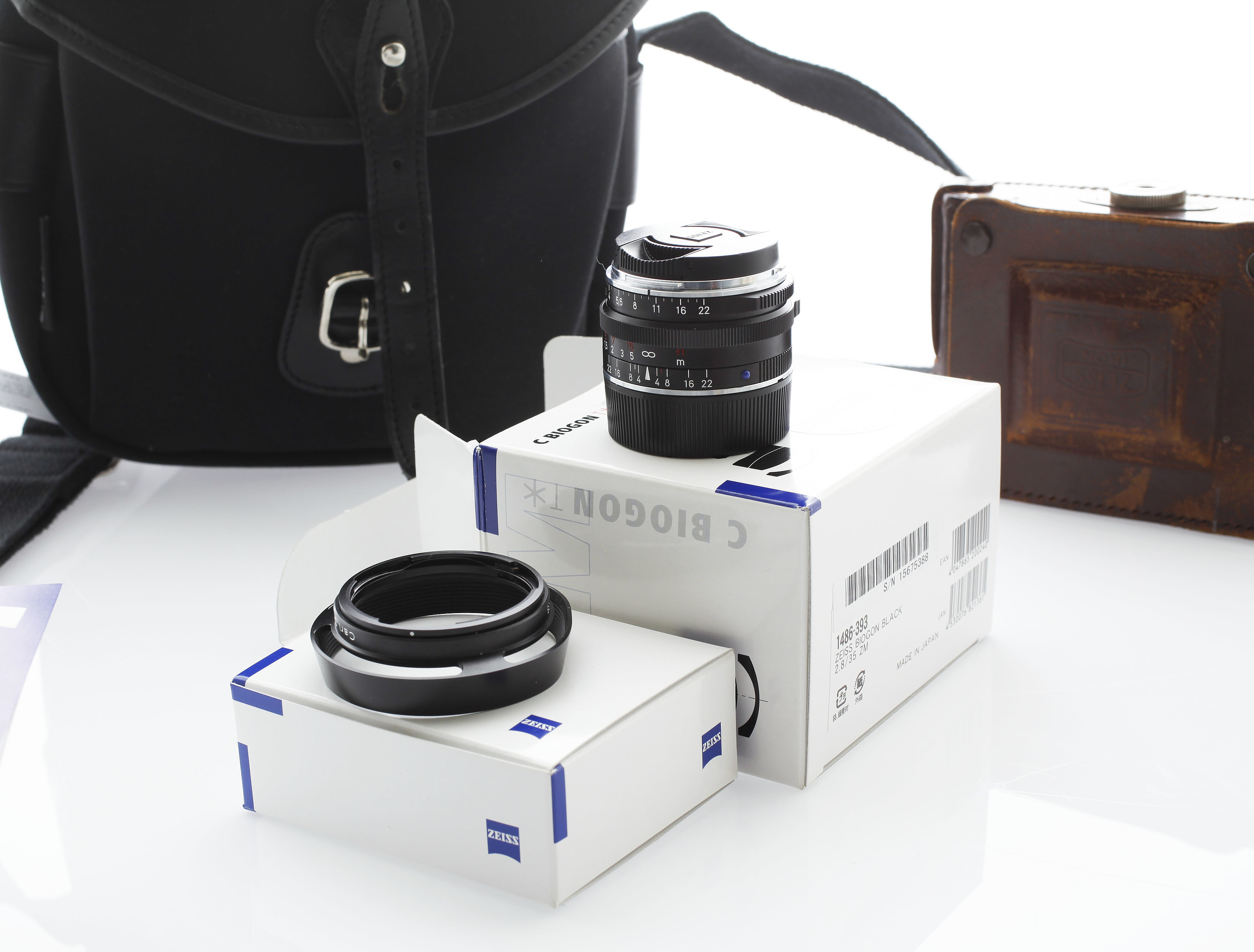 Two cameras from Leica and Zeiss Ikon with accessories, 20th/21st ...