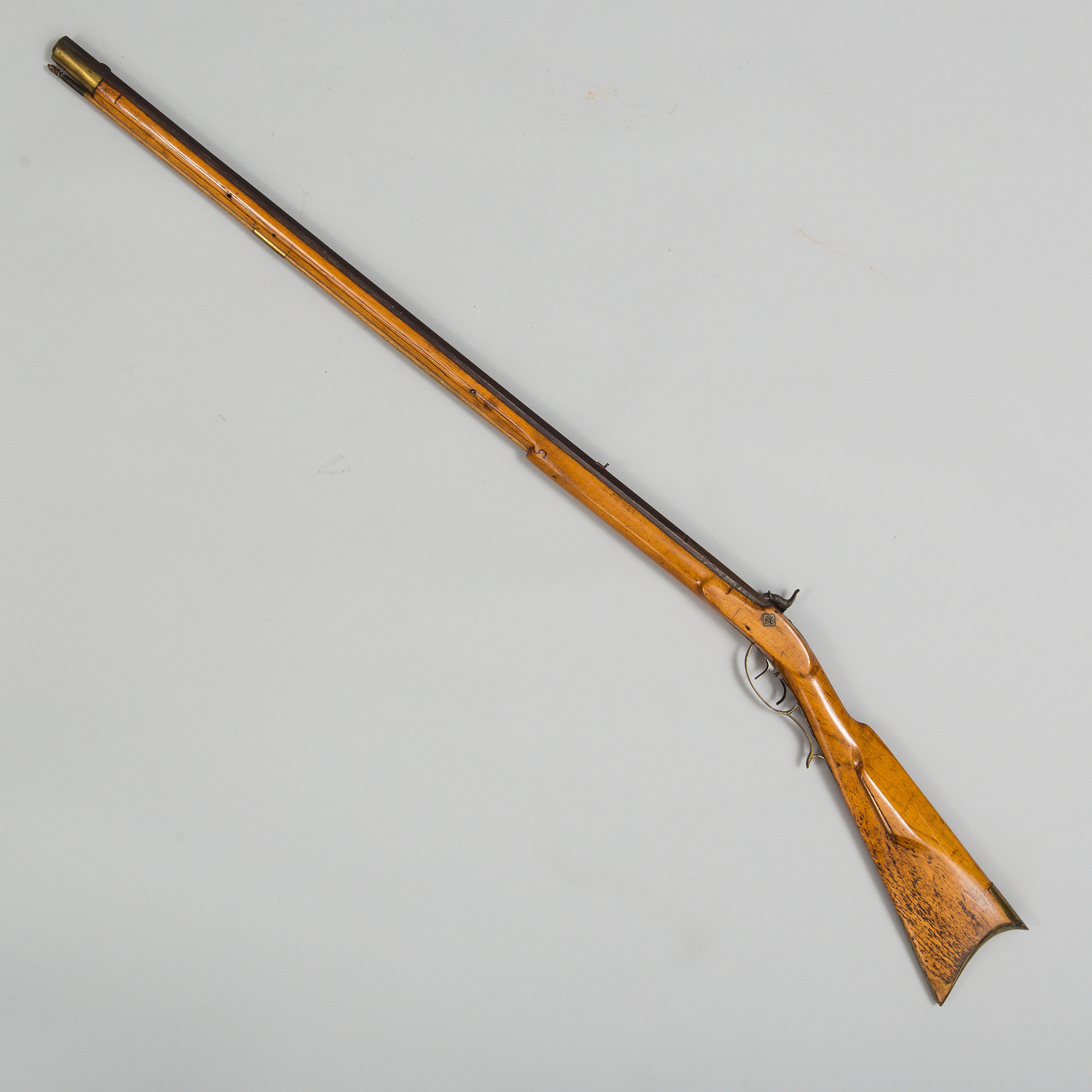 An early American 19th century percussion rifle ("Kentucky Longrifle ...