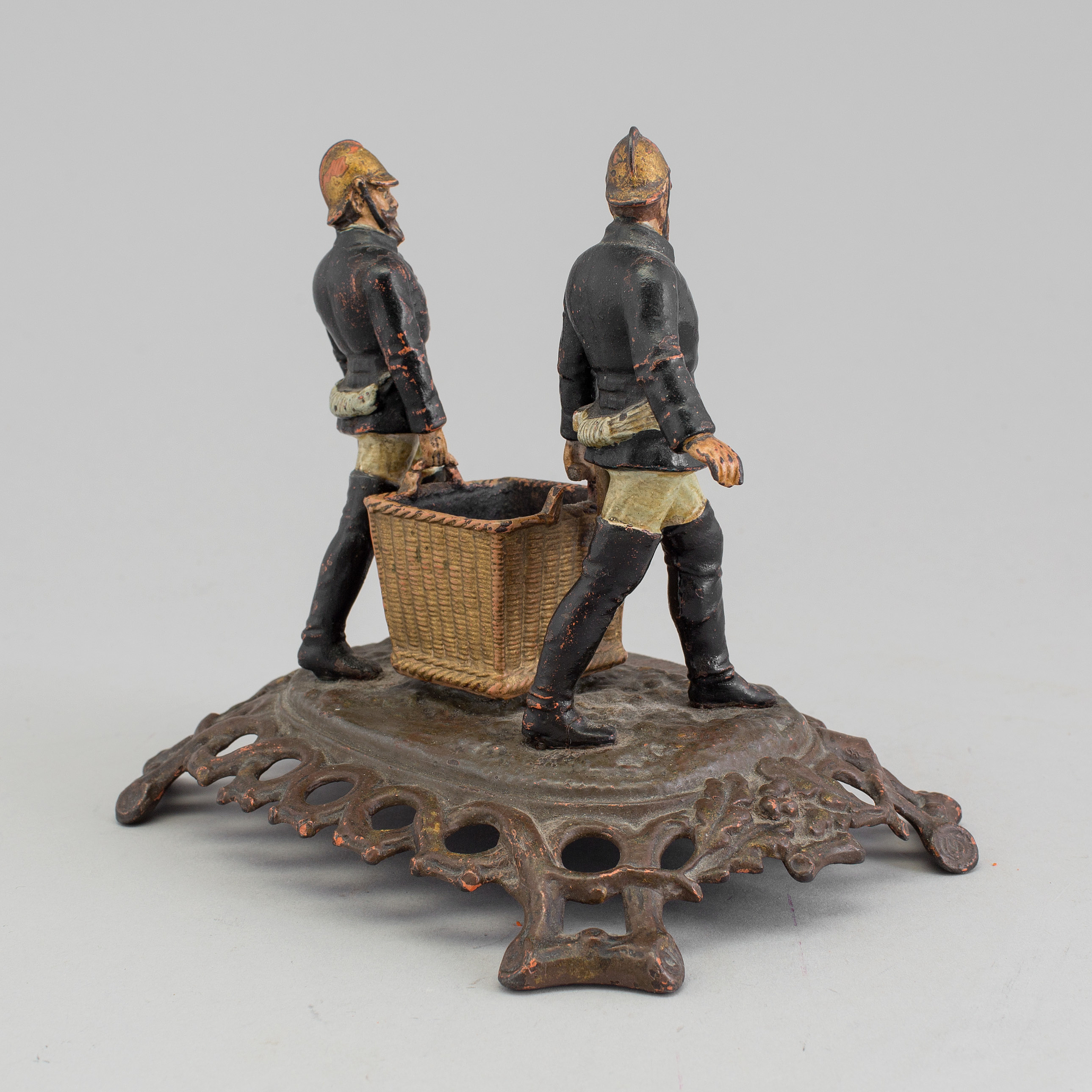 A German 1850s bronze figural firemen match holder marked "VERLAG BEI E ...