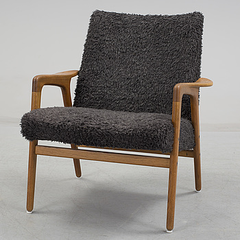 YNGVE EKSTRÖM, a 'Mingo' oak armchair, designed in 1956. - Bukowskis