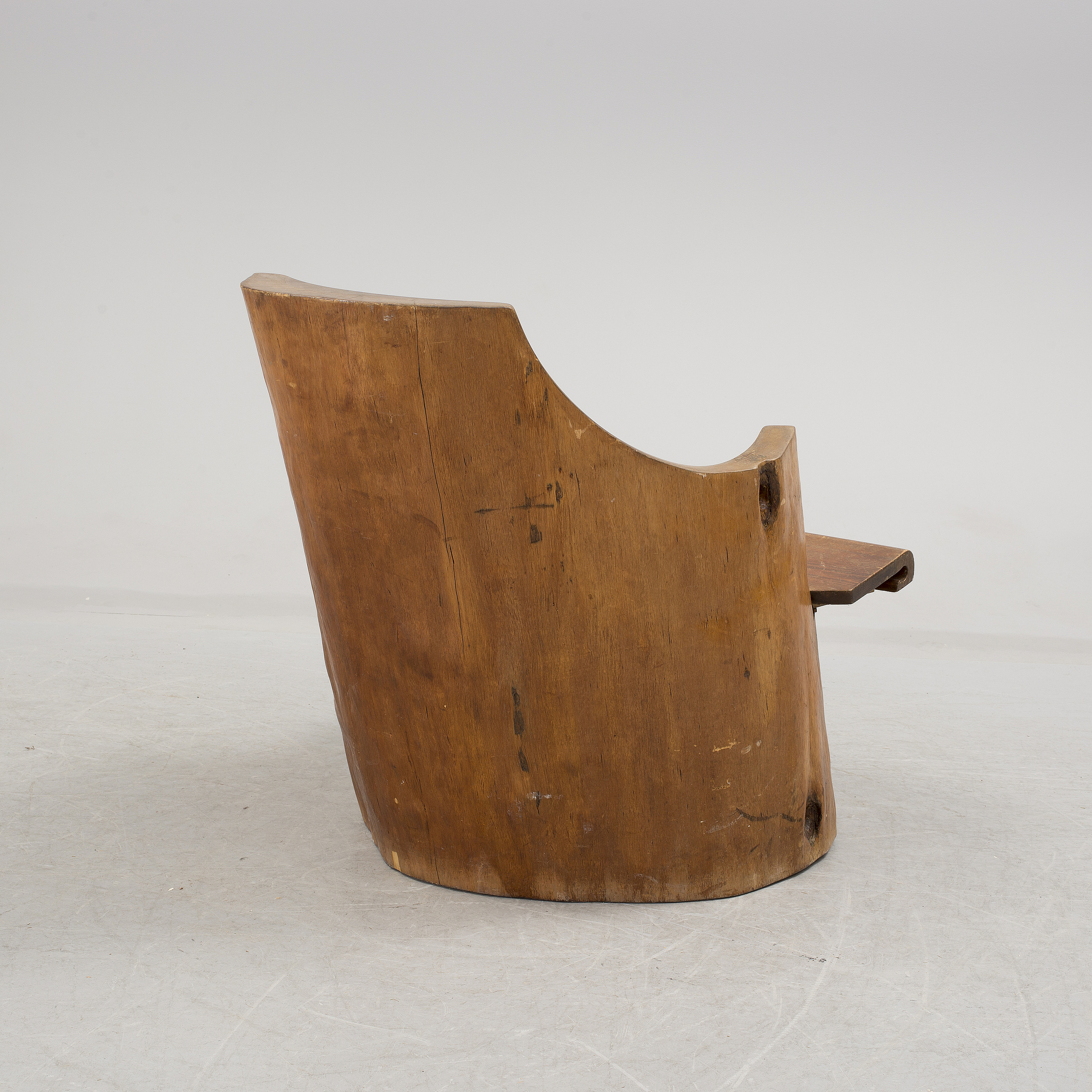 A tree trunk chair from the 20th century. - Bukowskis