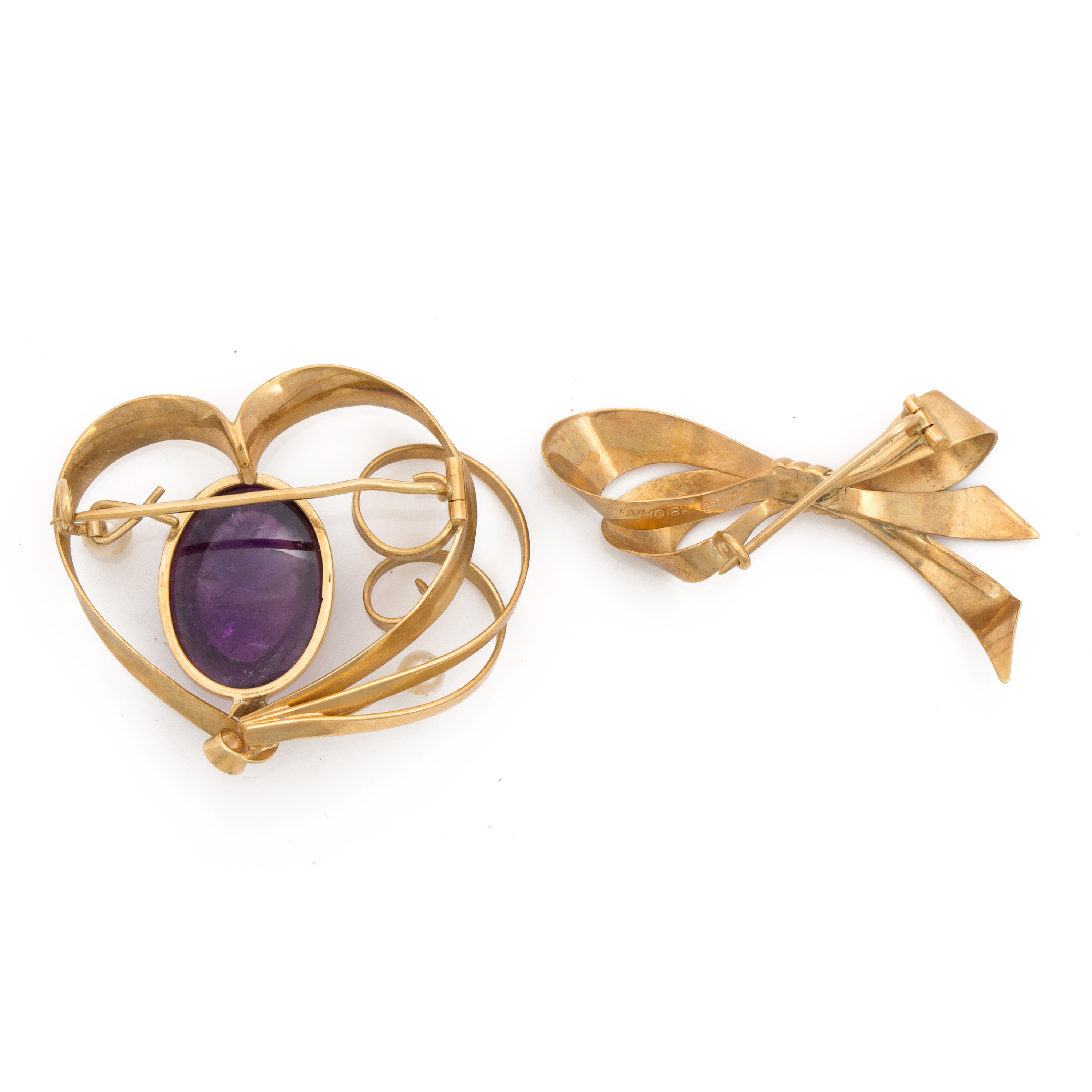 Two 18K gold brooches. - Bukowskis