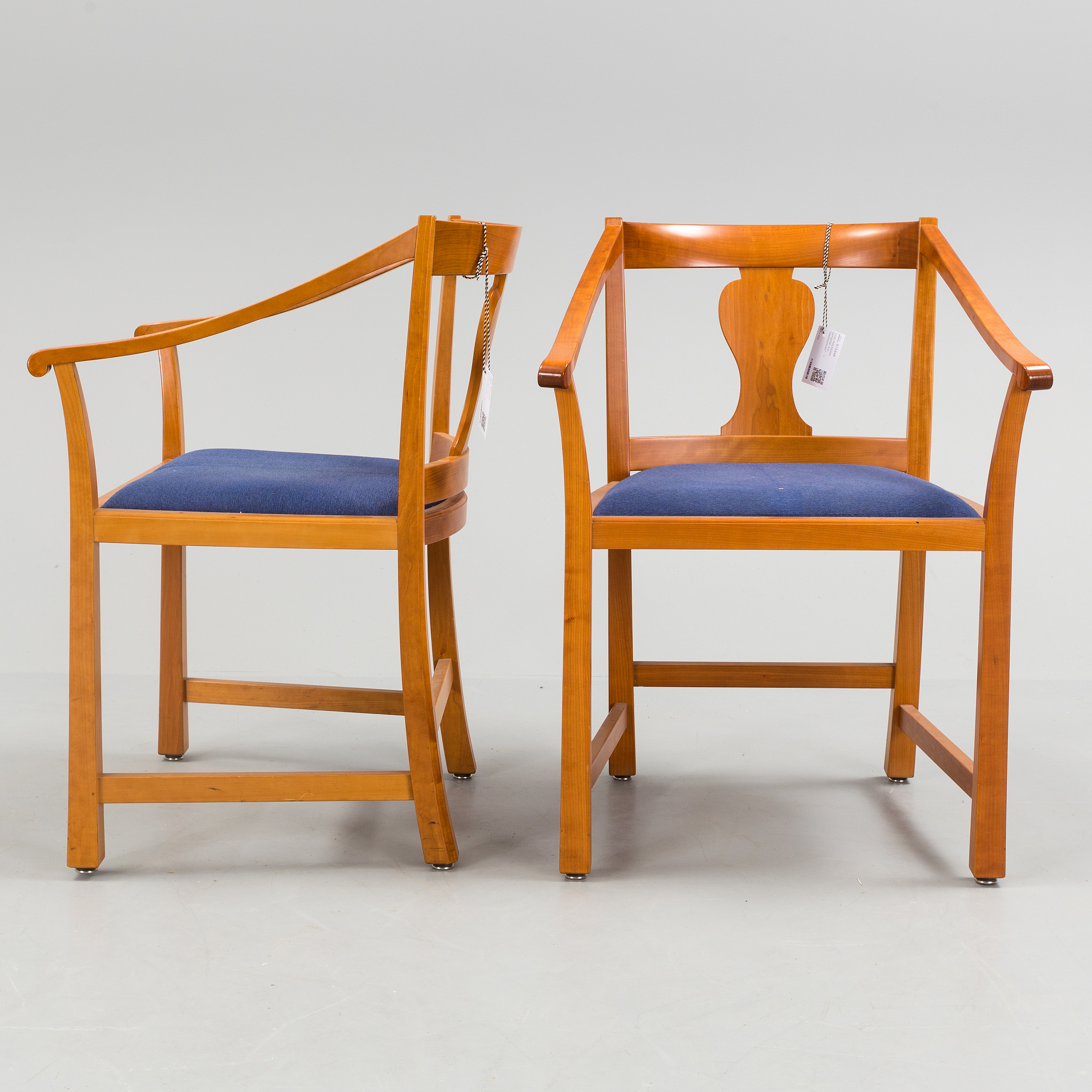 A set of four "Stadshusstolen" armchairs by Carl Malmsten. - Bukowskis