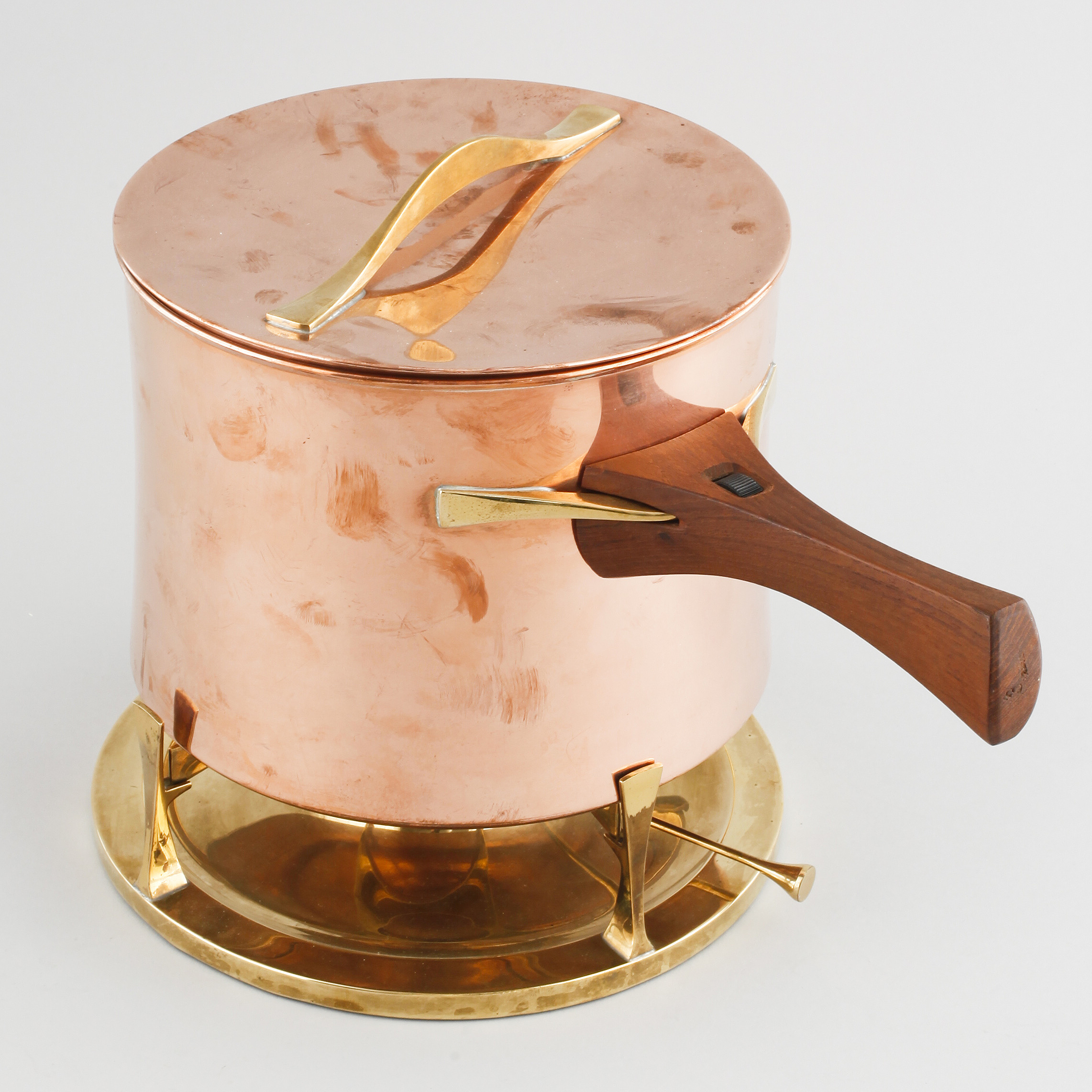 A copper pot with rechaud by Jens Quistgaard, third quarter of the 20th ...