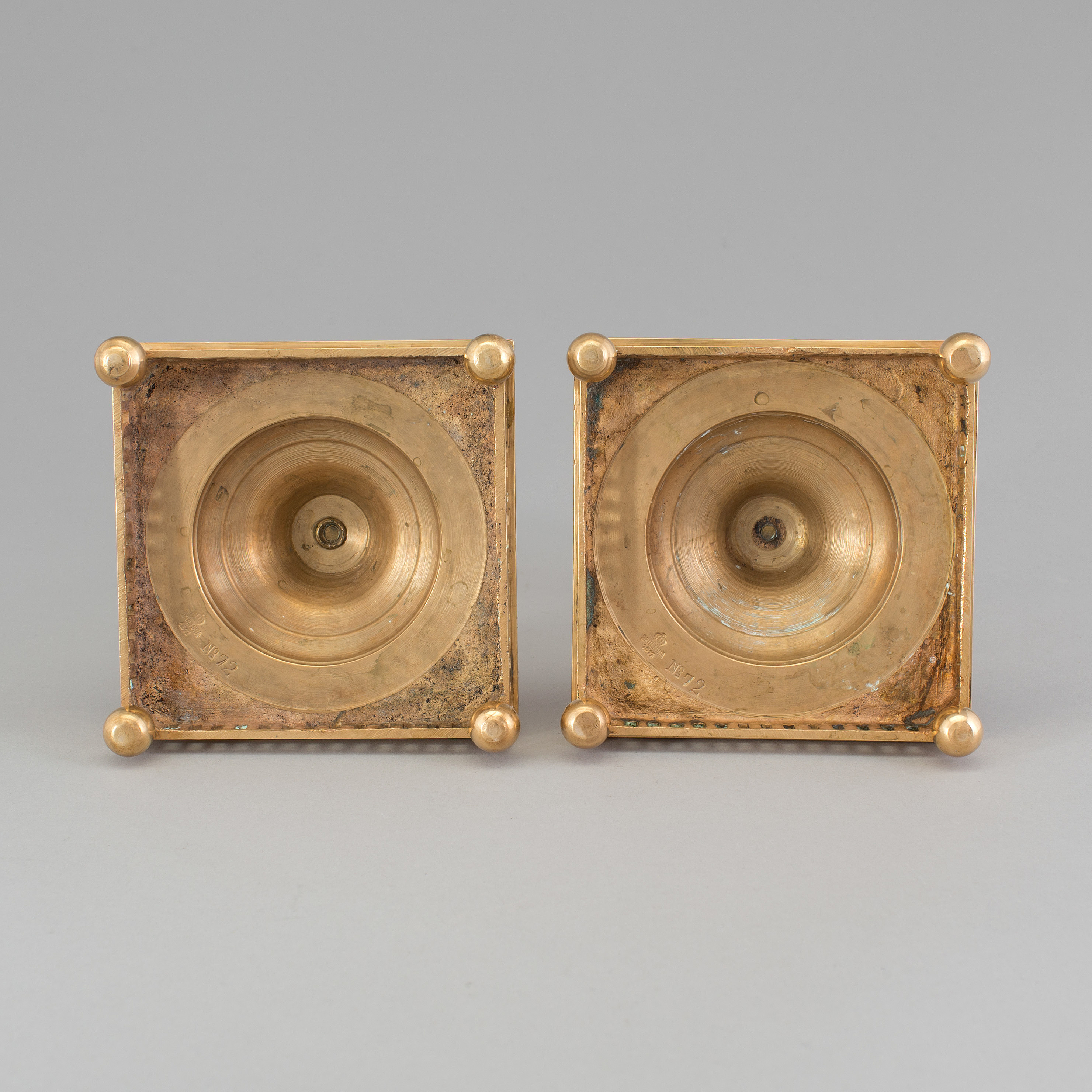 SKULTUNA MESSINGSBRUK, a pair of candlesticks in brass. 20 th century ...