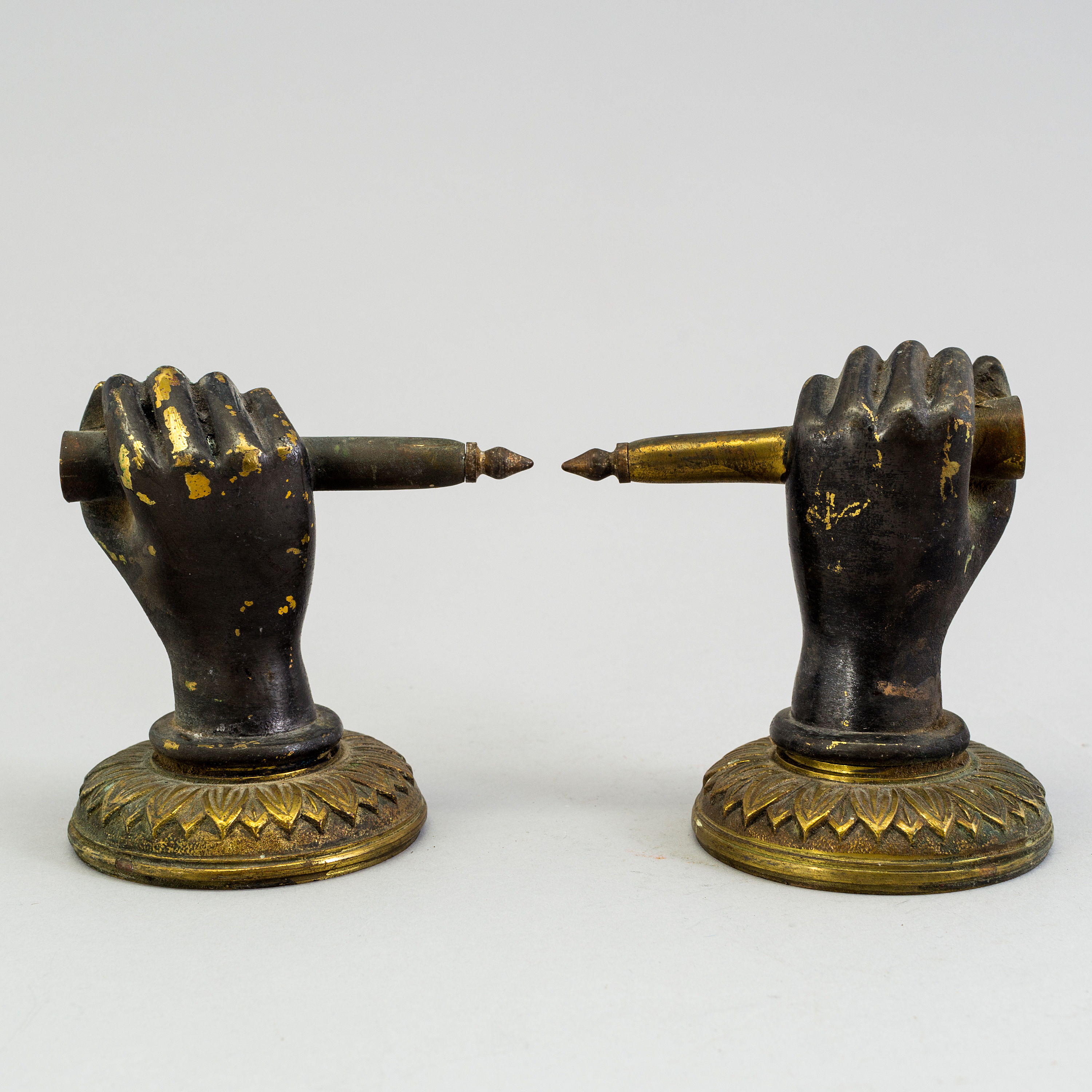 A PAIR OF ART DÉCO ORNAMENTS, gilded bronze, 1920s. - Bukowskis