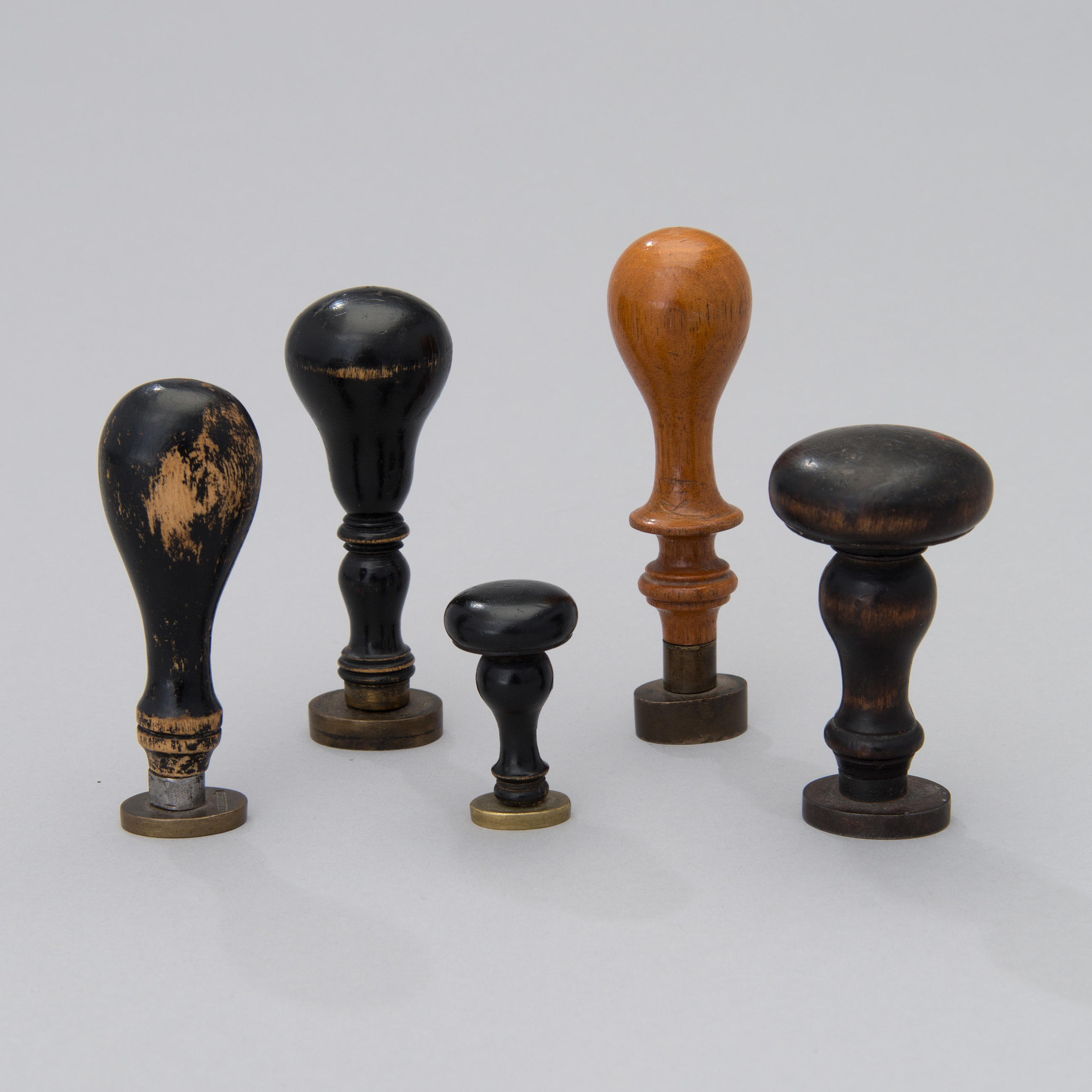 Five seals in brass and wood from the latter half of the 19th century ...