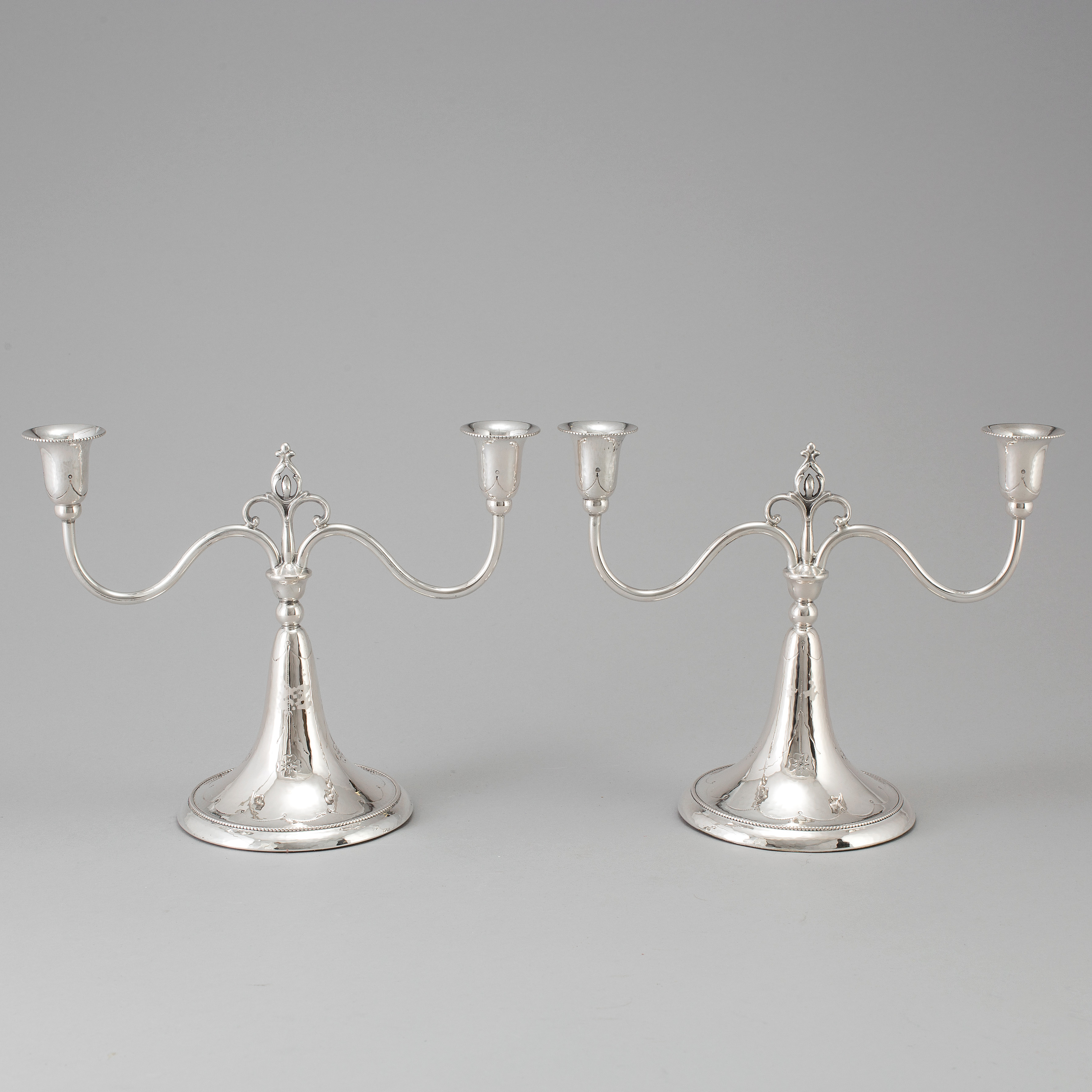 A pair of candelabras in silver, by Karl Anderson, Stockholm, 1929 ...
