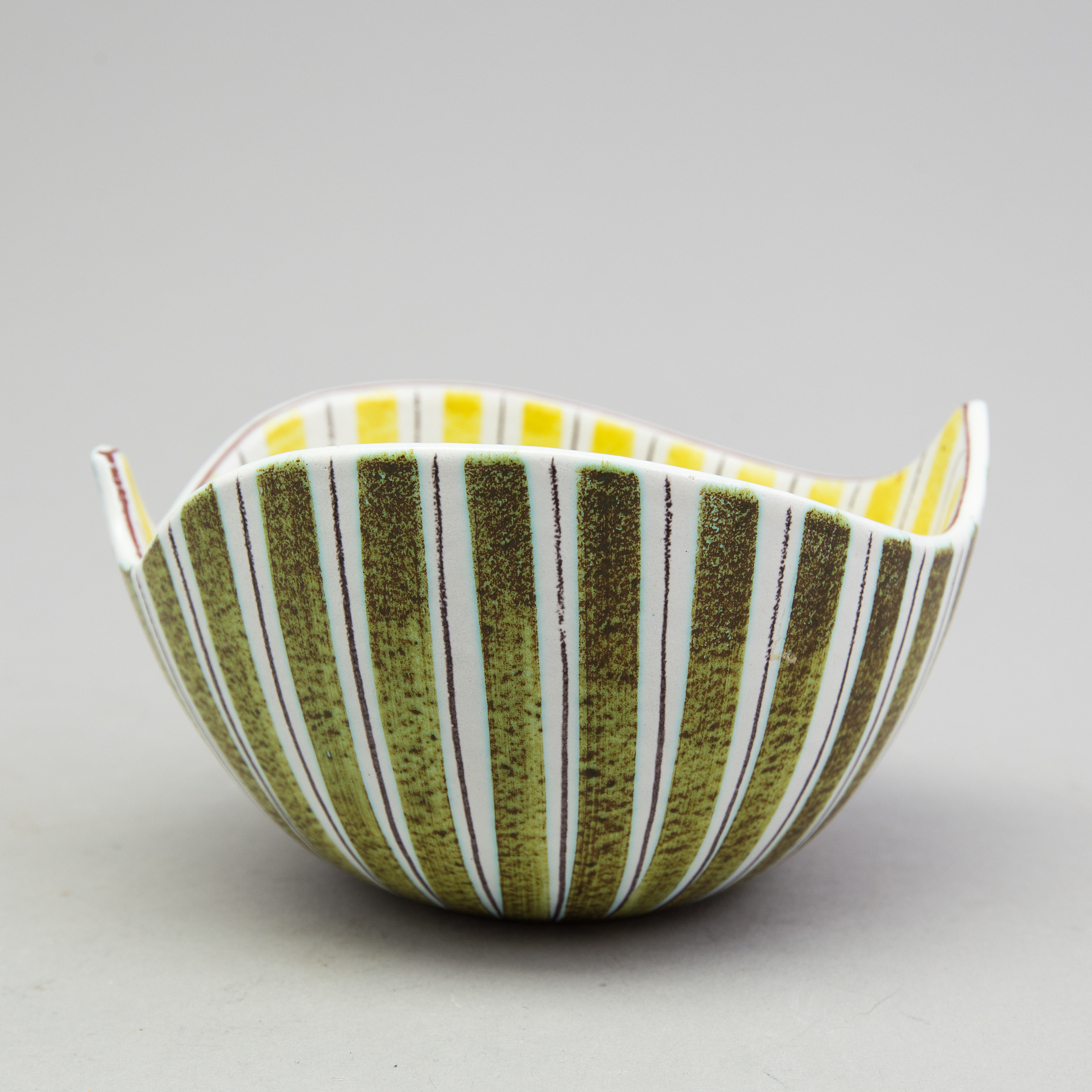A stoneware bowl designed by Stig Lindberg, signed and numbered for ...