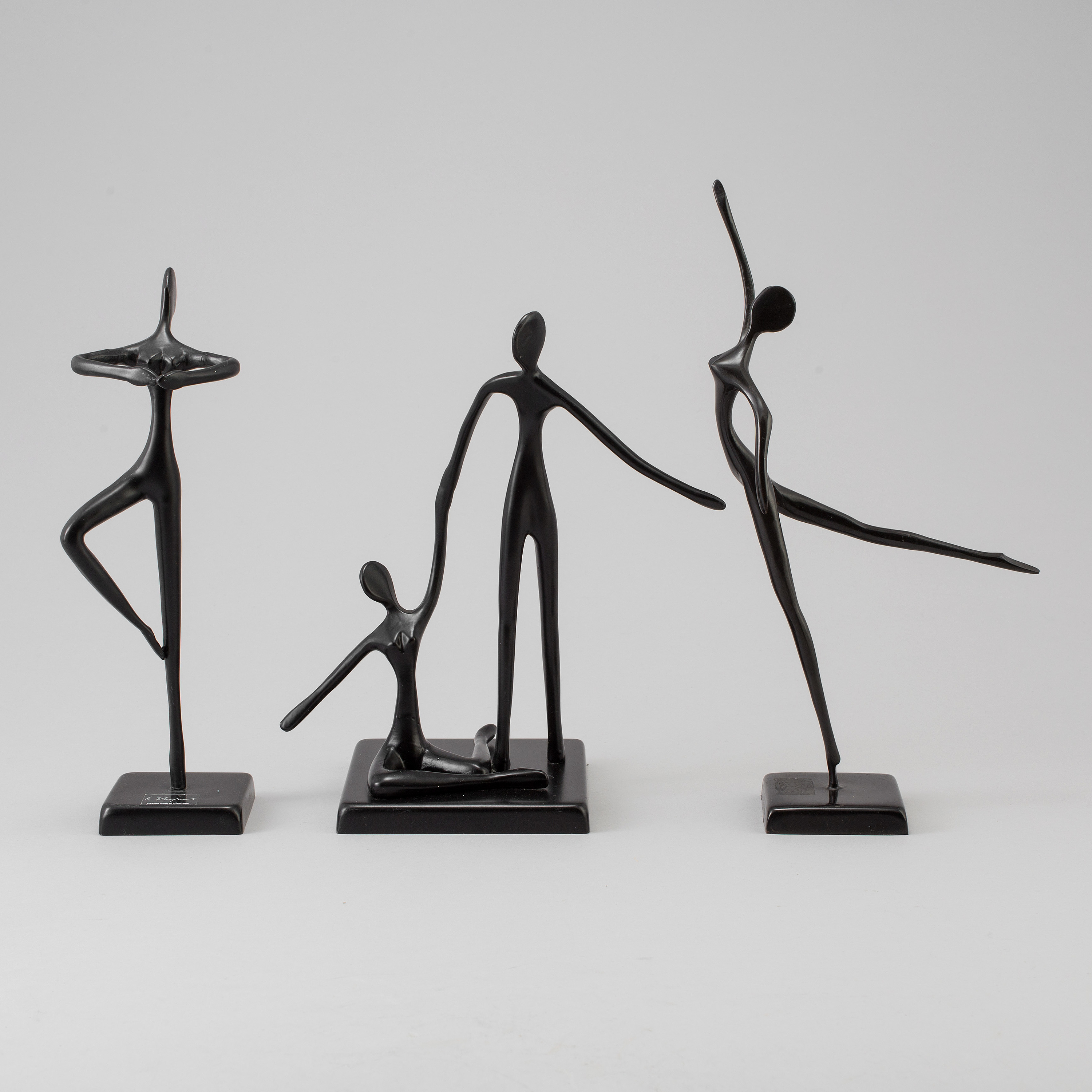 Three bronze figures design Bodrul Khalique. - Bukowskis