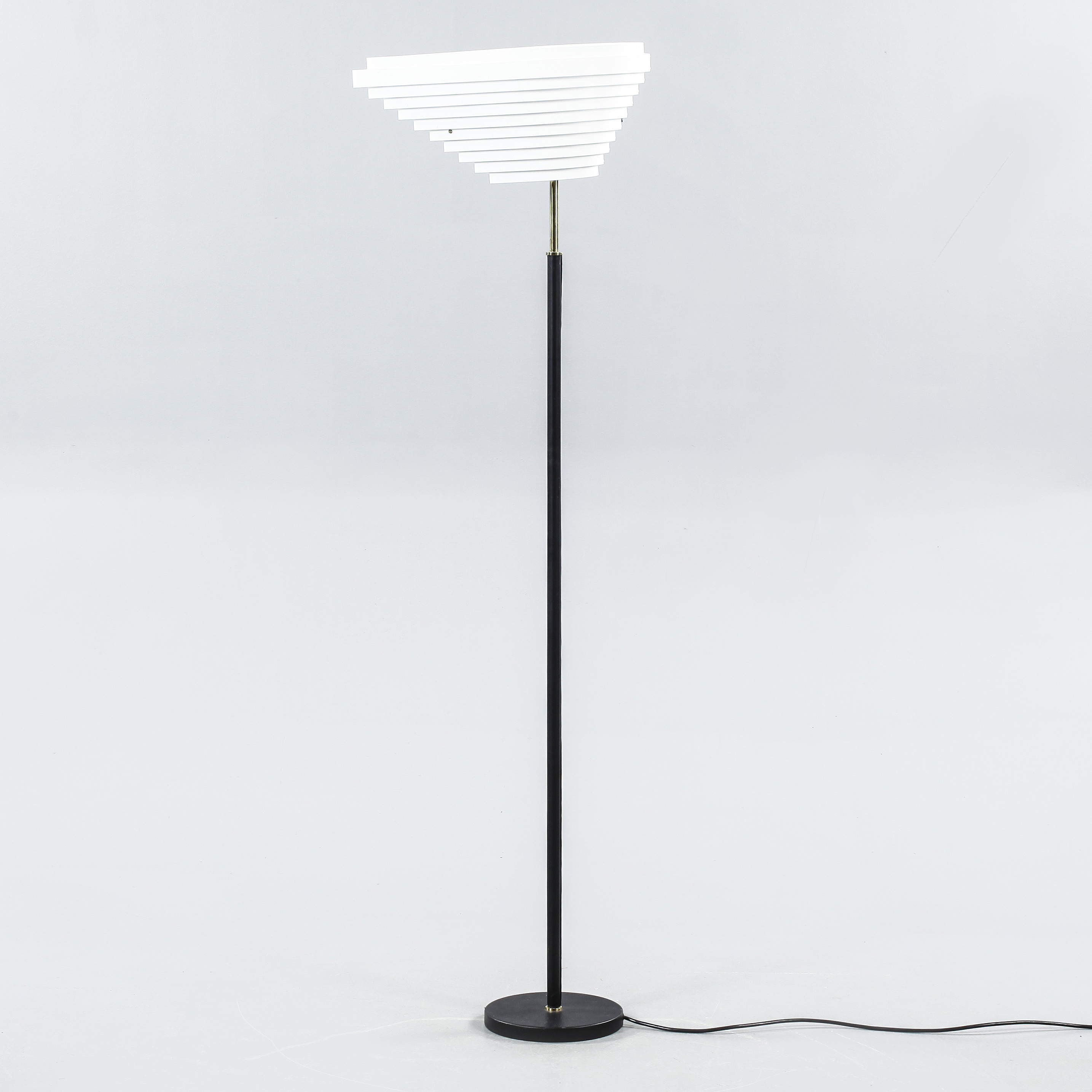A floor lamp named "Angel wing", model A 805, designed by Alvar Aalto ...