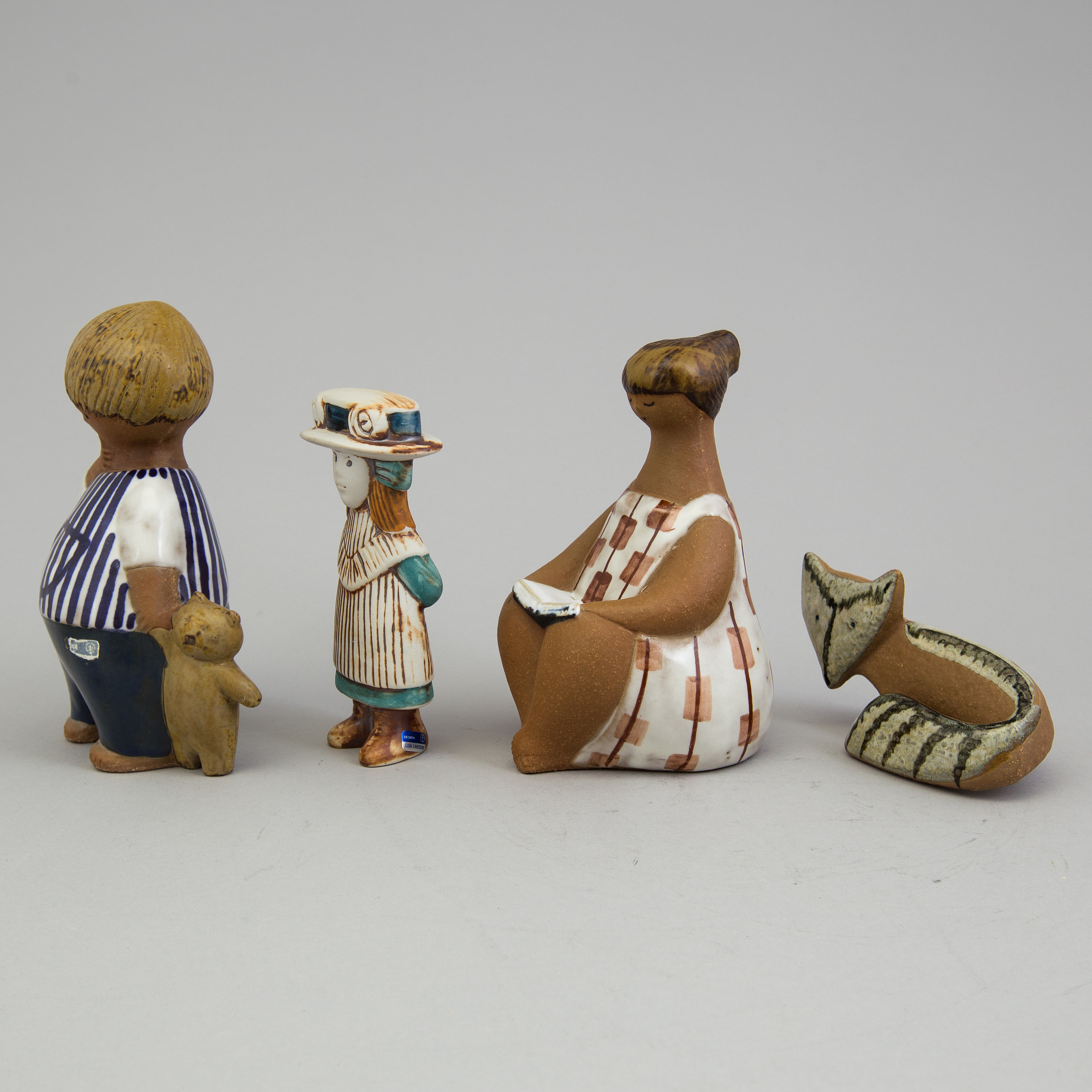 LISA LARSON, 4 stycken figuriner, stengods, Gustavsberg. - Bukowskis