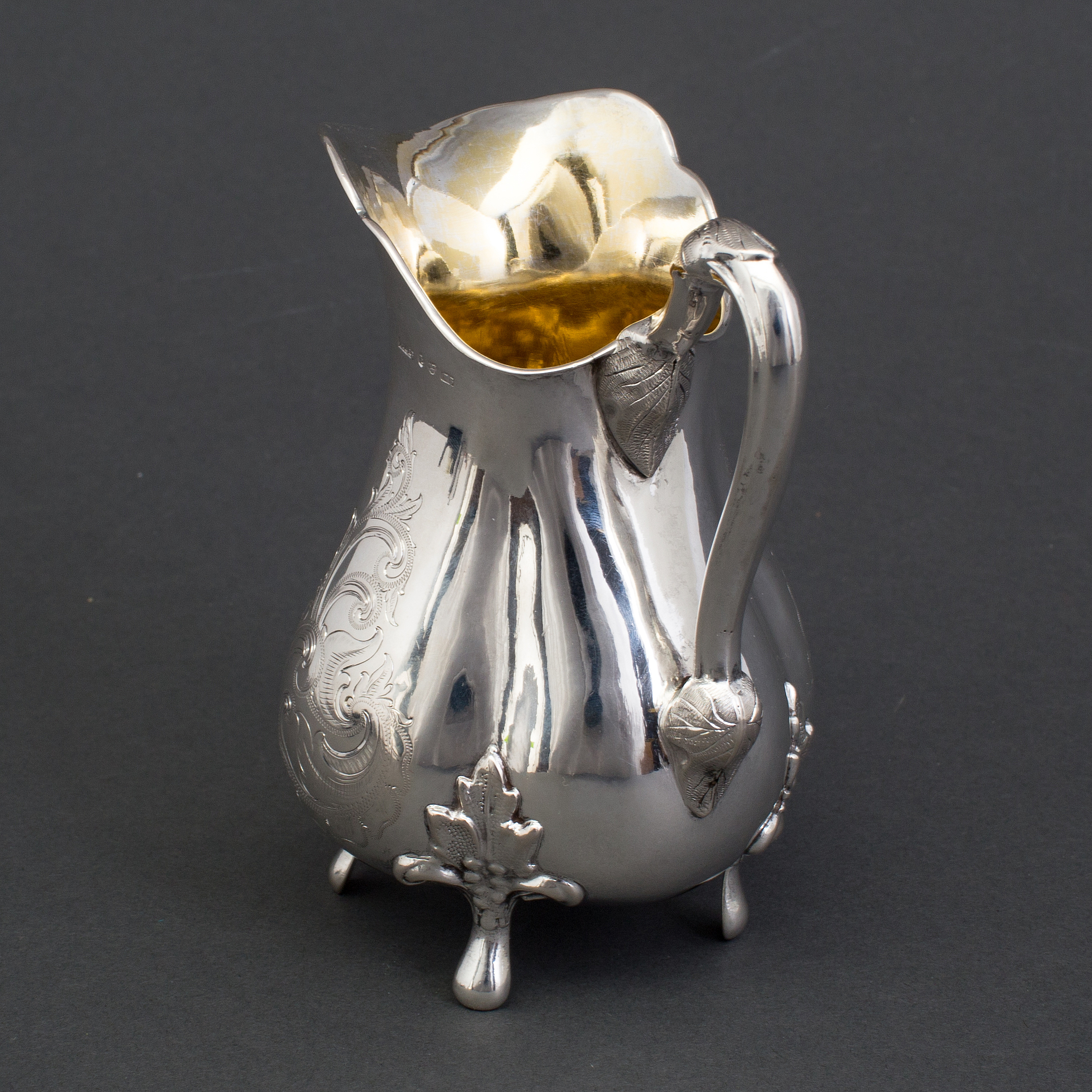 a silver cream pot by Johan Theodor Folcker Stockholm 1864. Weight 128 ...