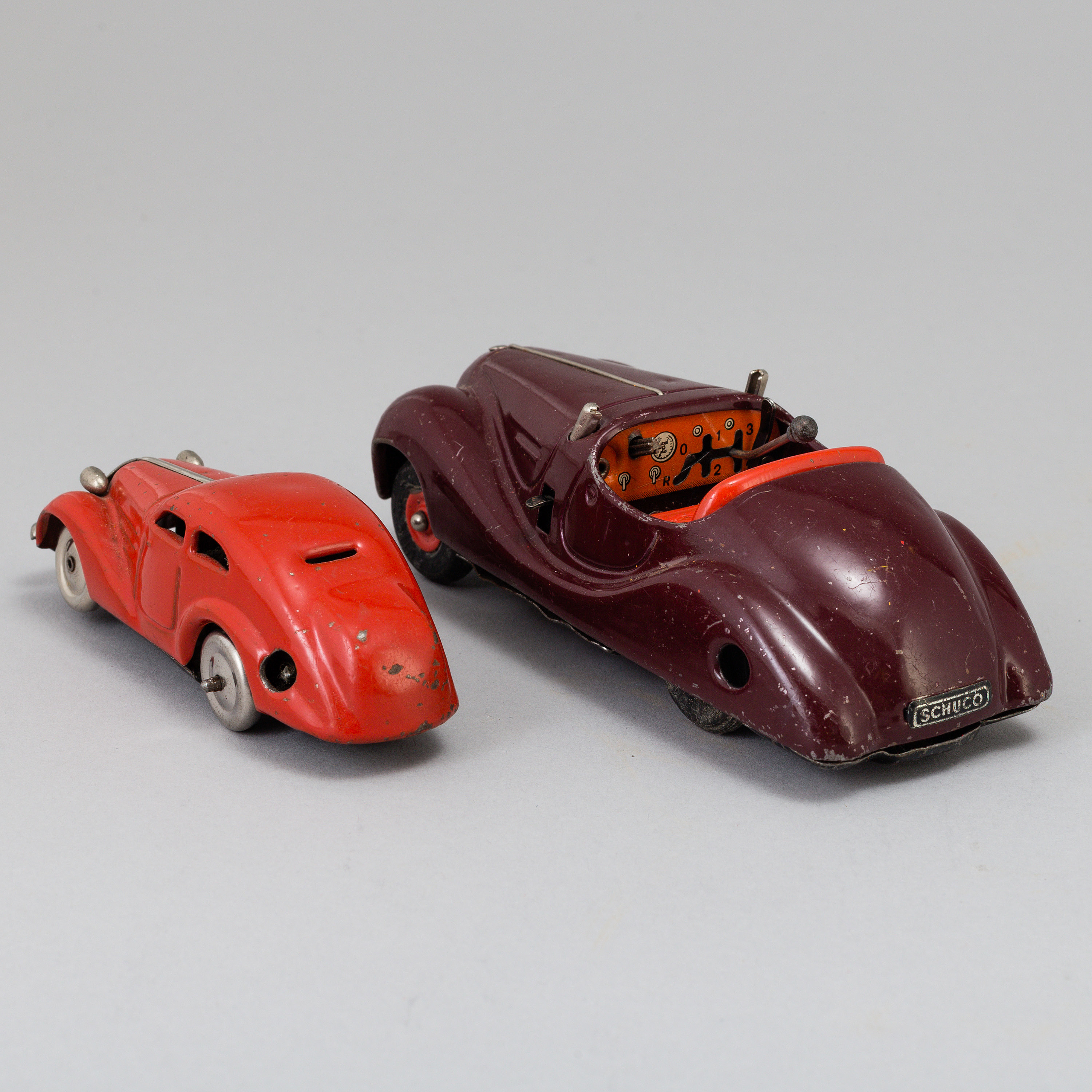 TWO TINPLATE SCHUCO TOY CARS. - Bukowskis