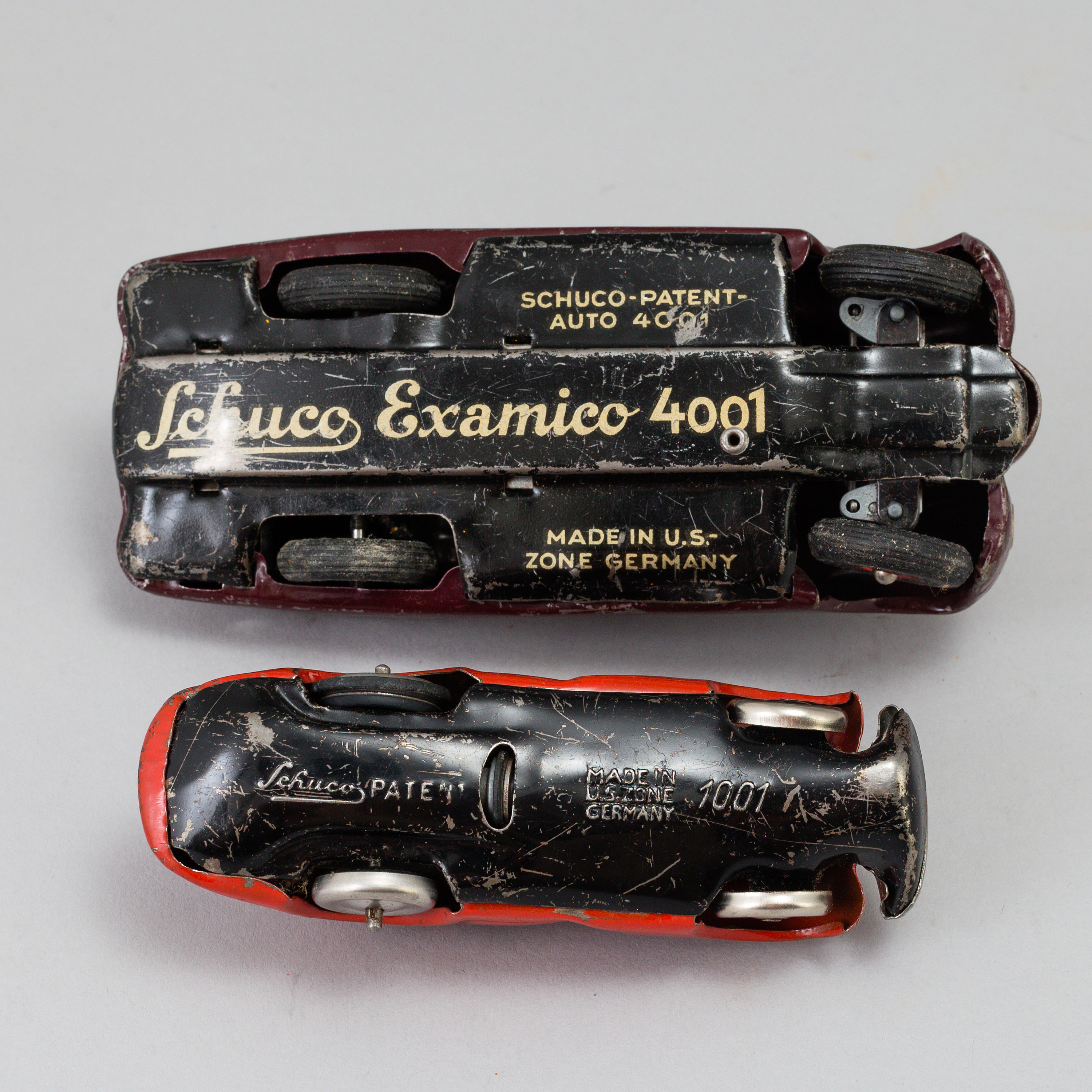 TWO TINPLATE SCHUCO TOY CARS. - Bukowskis