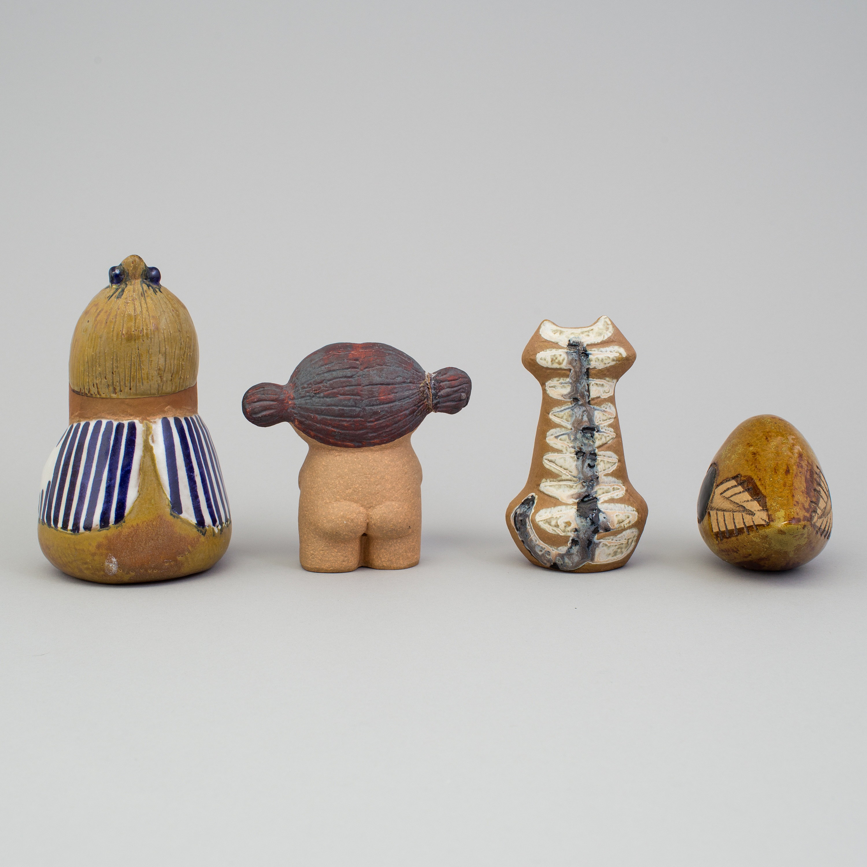 LISA LARSON, figurer, 4 st, stengods, Gustavsberg. - Bukowskis