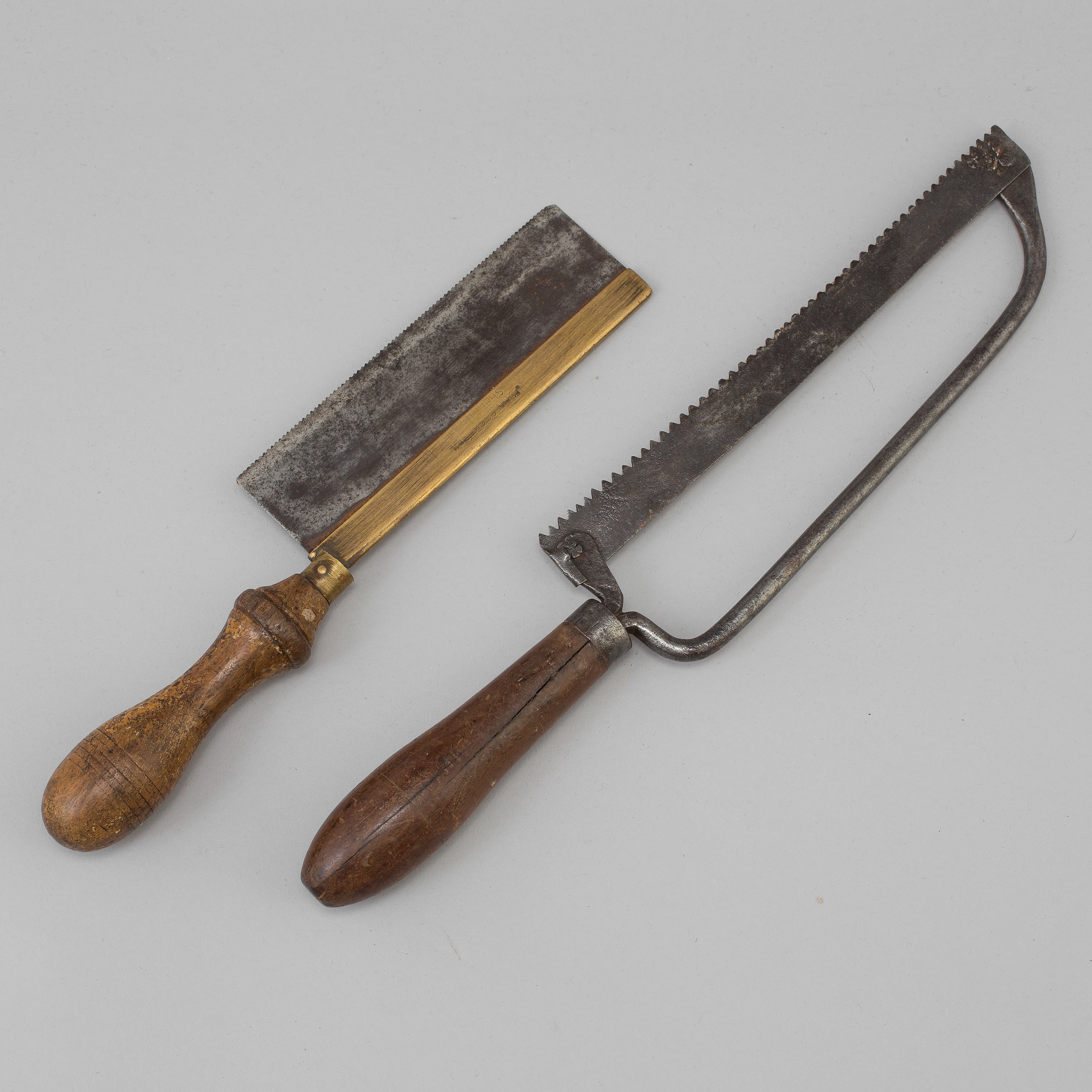 TWO 19TH CENTURY IRON SAWS. - Bukowskis