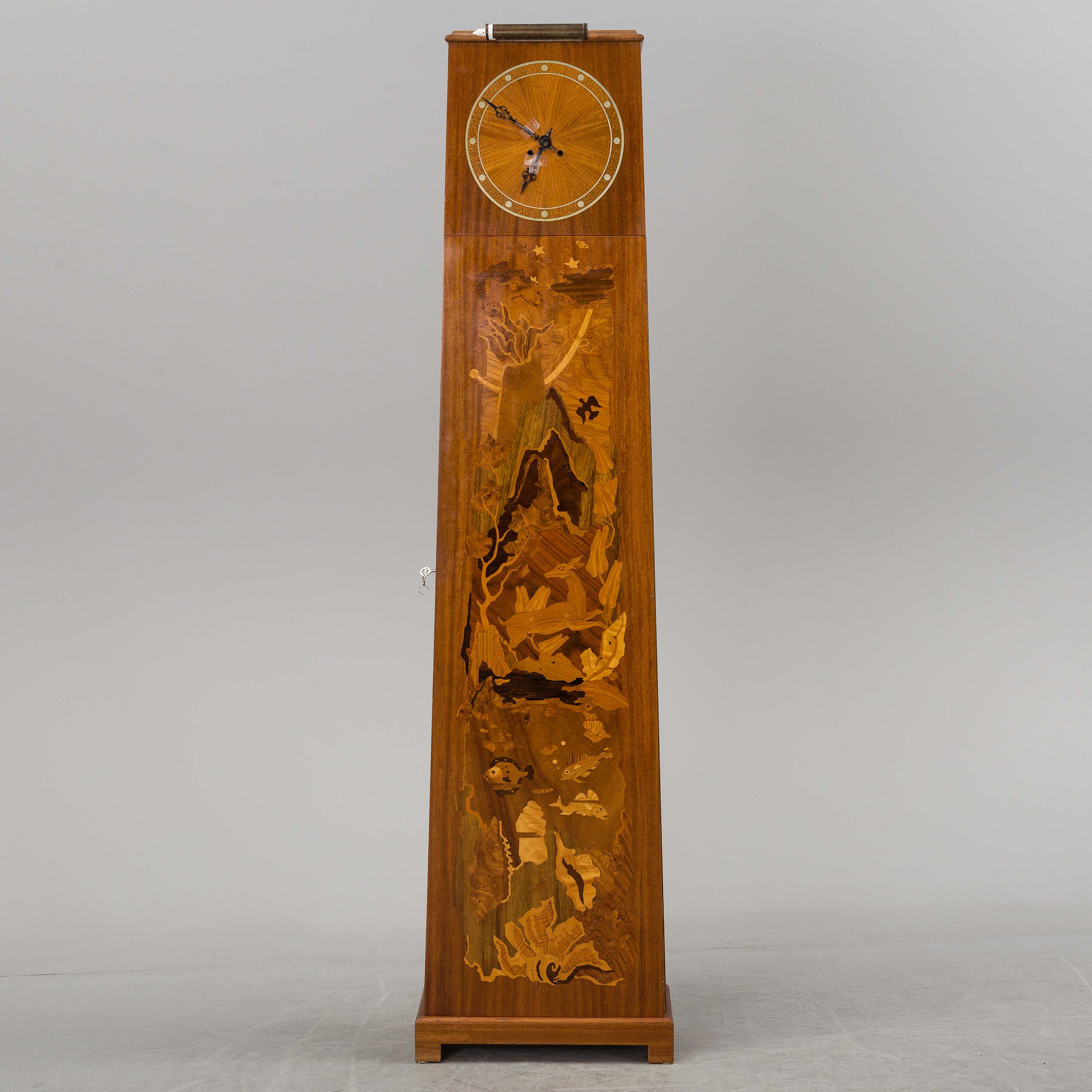 A grandfather clock by Birger Ekman, Mjölby Intarsia, 1940s. - Bukowskis