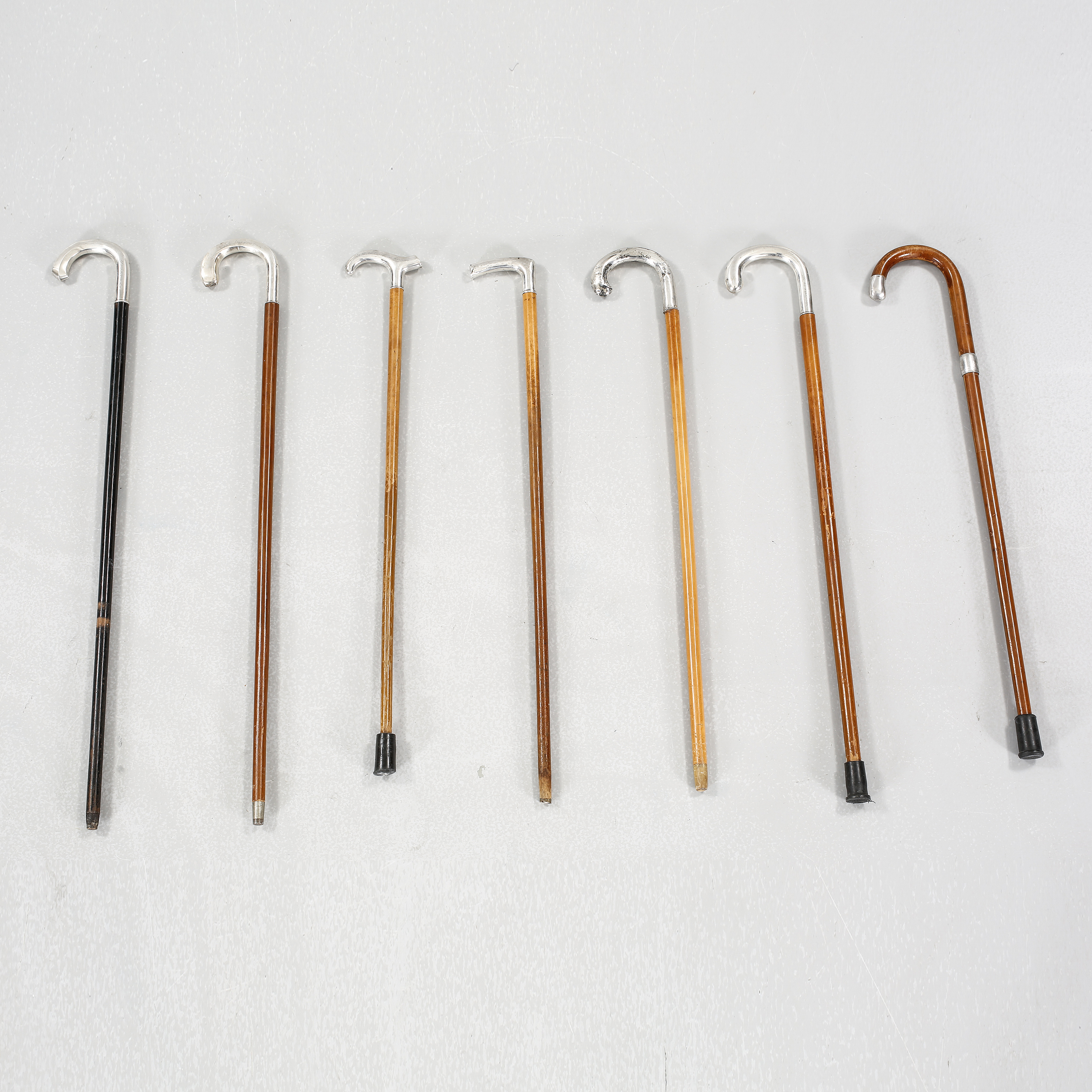 Seven canes with silver handles, first half of the 20th century ...