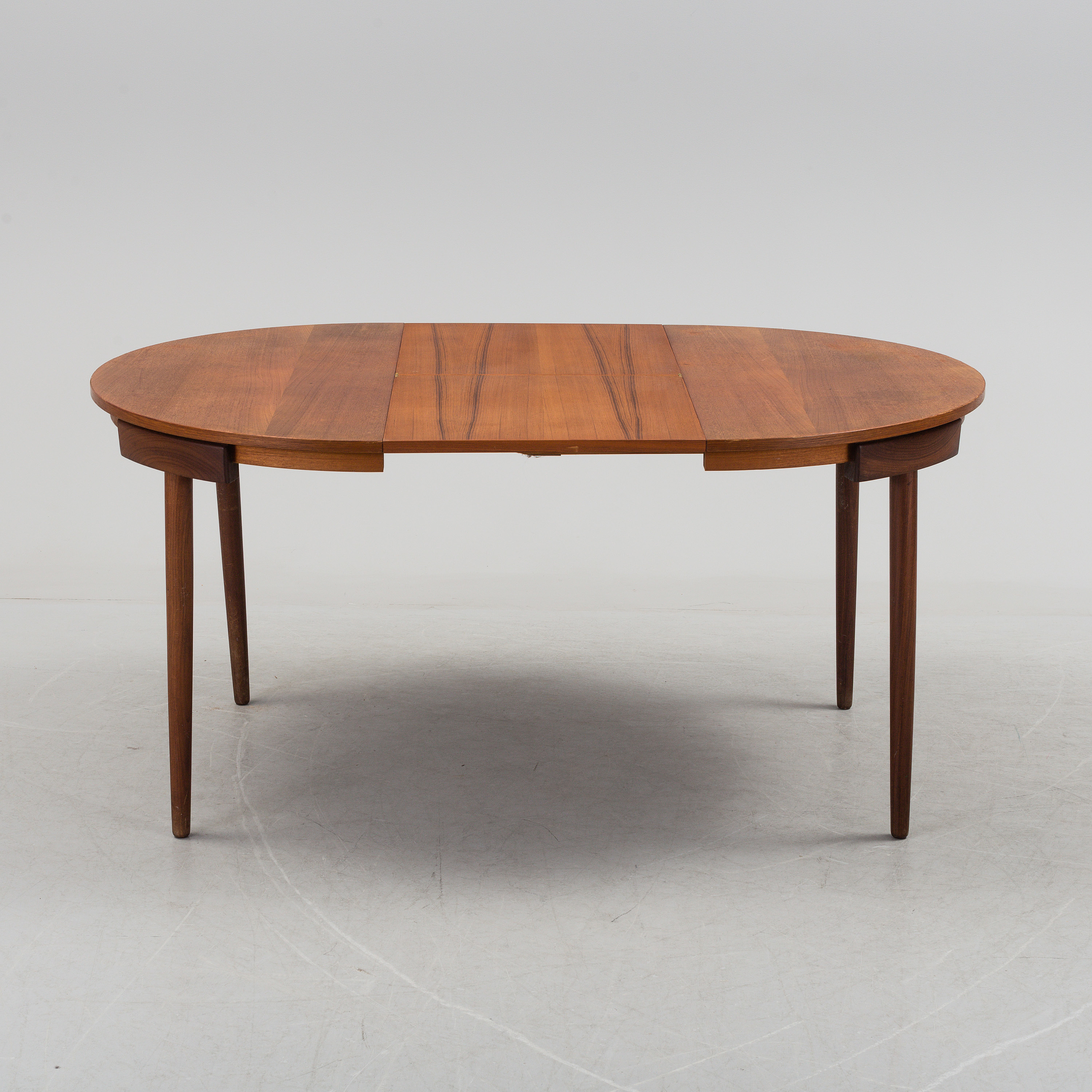 A dining table and three chairs by Hans Olsen, Frem Røjle, Denmark ...