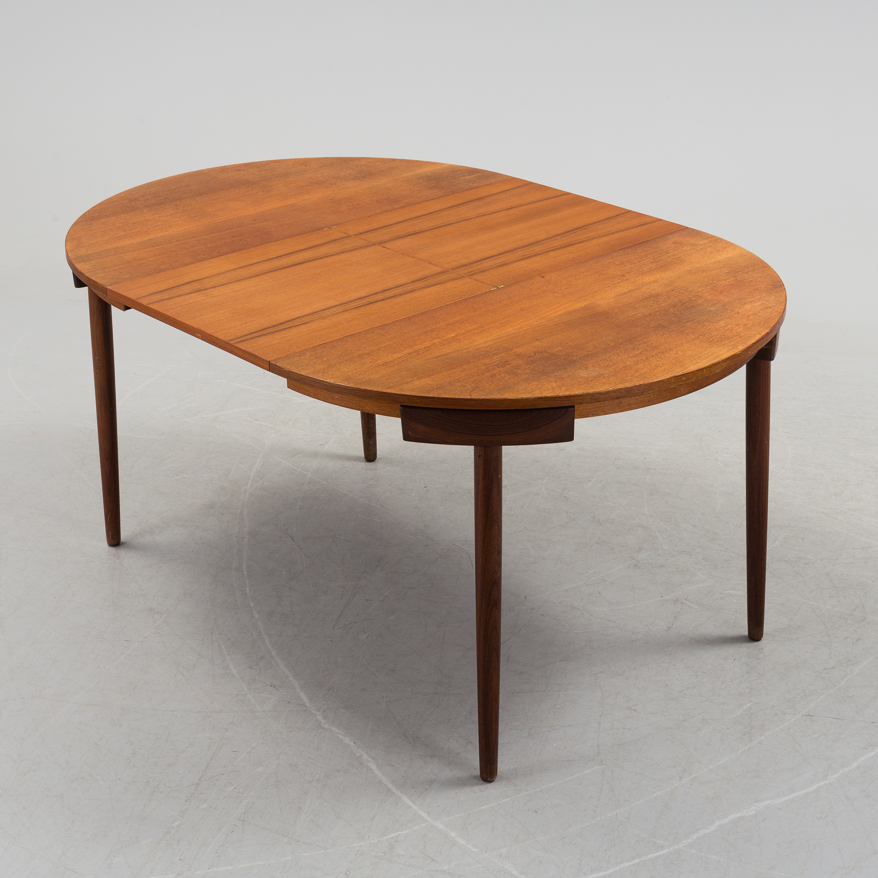 A dining table and three chairs by Hans Olsen, Frem Røjle, Denmark ...