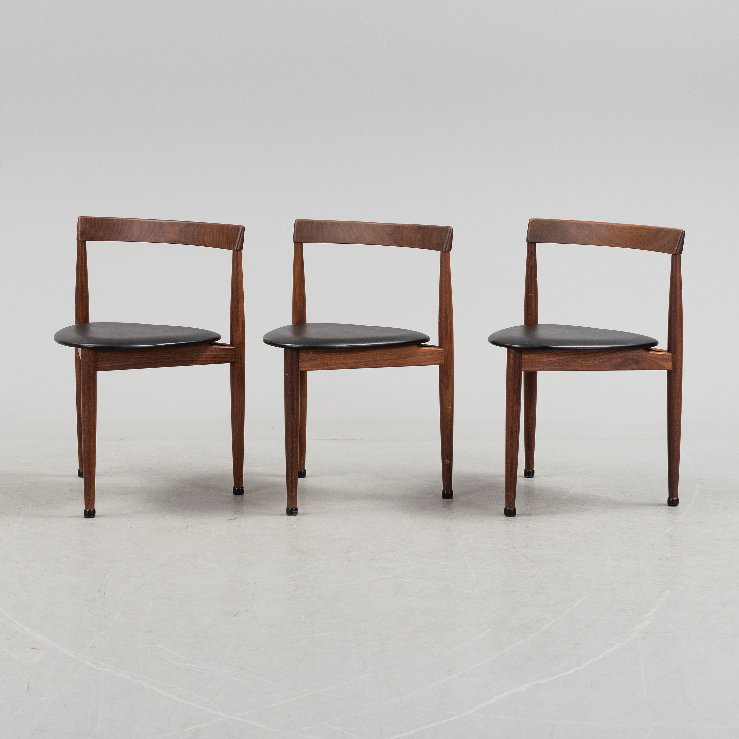 A dining table and three chairs by Hans Olsen, Frem Røjle, Denmark ...