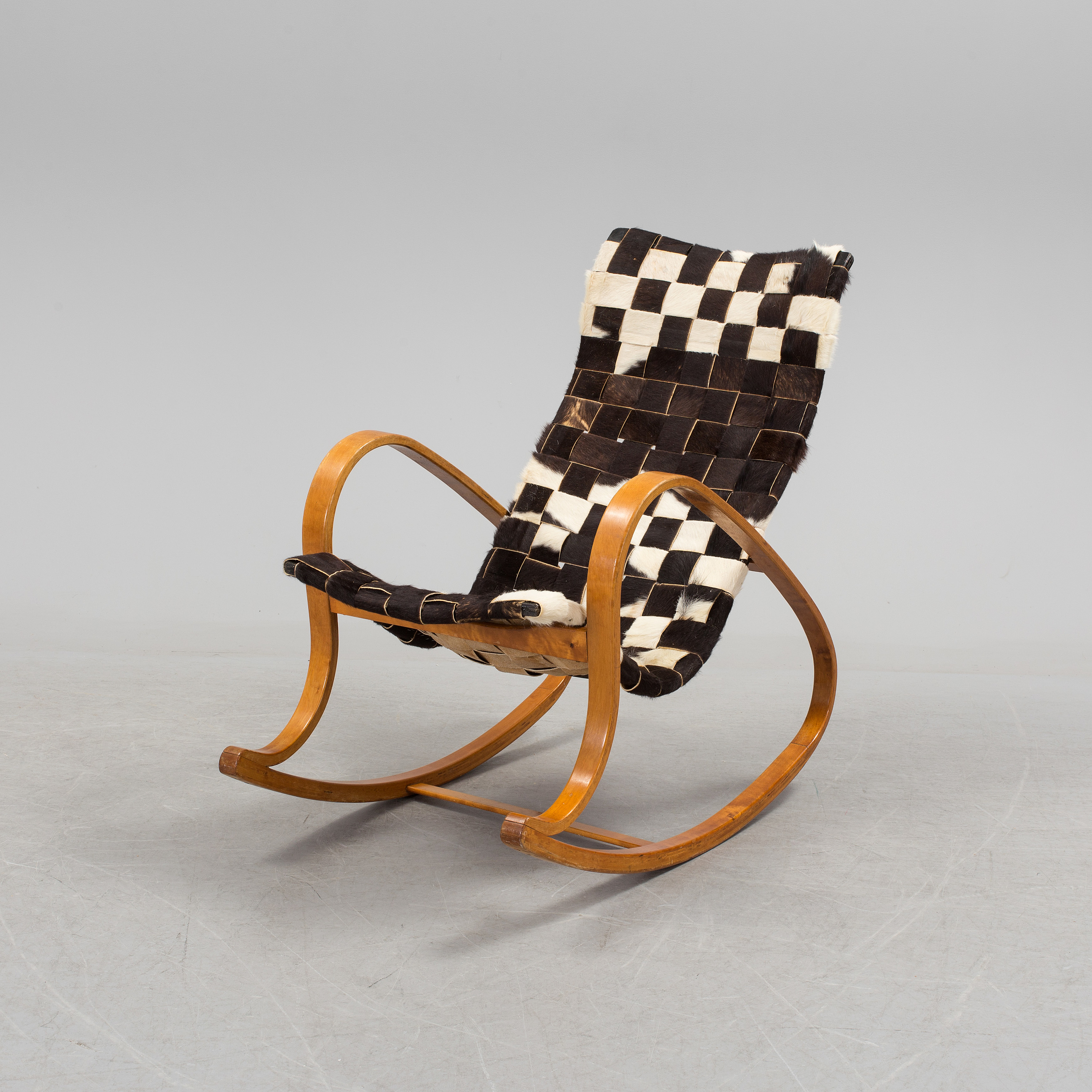 GUSTAF AXEL BERG, a birch rocking chair, 1940's. - Bukowskis