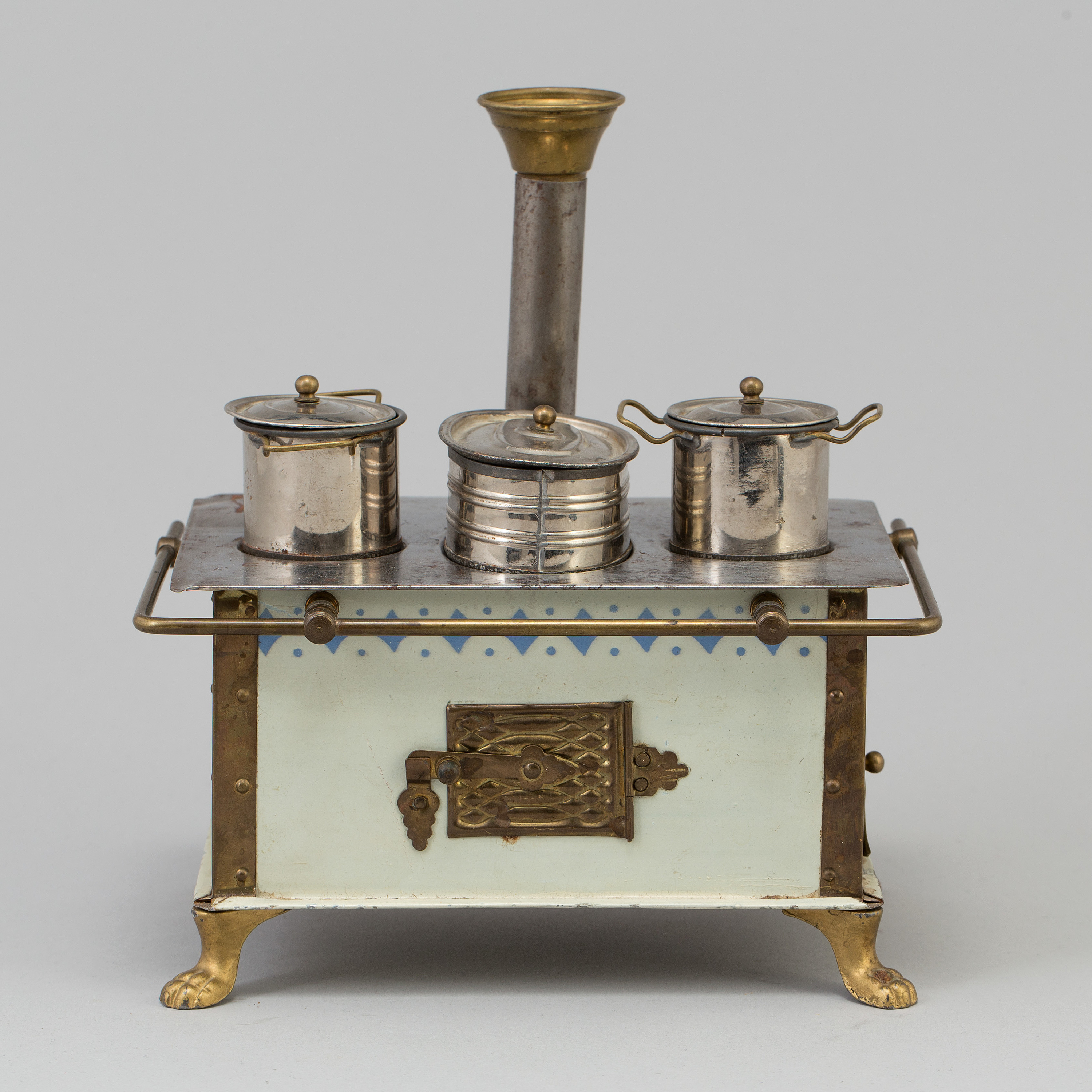 A German tin toy stove from the 1910 / 20´s. - Bukowskis