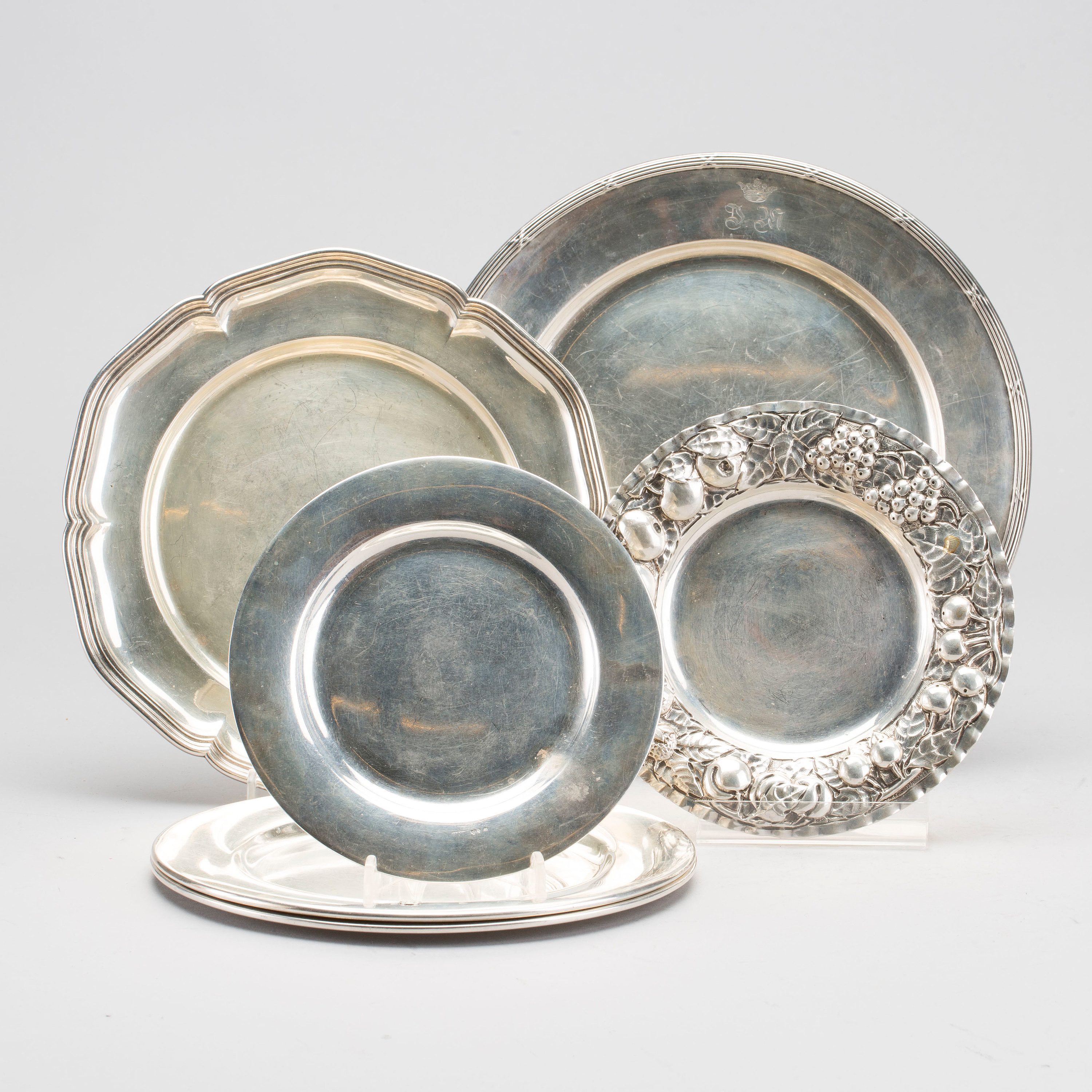 A set of six different silver plates, first half of the 20th century ...
