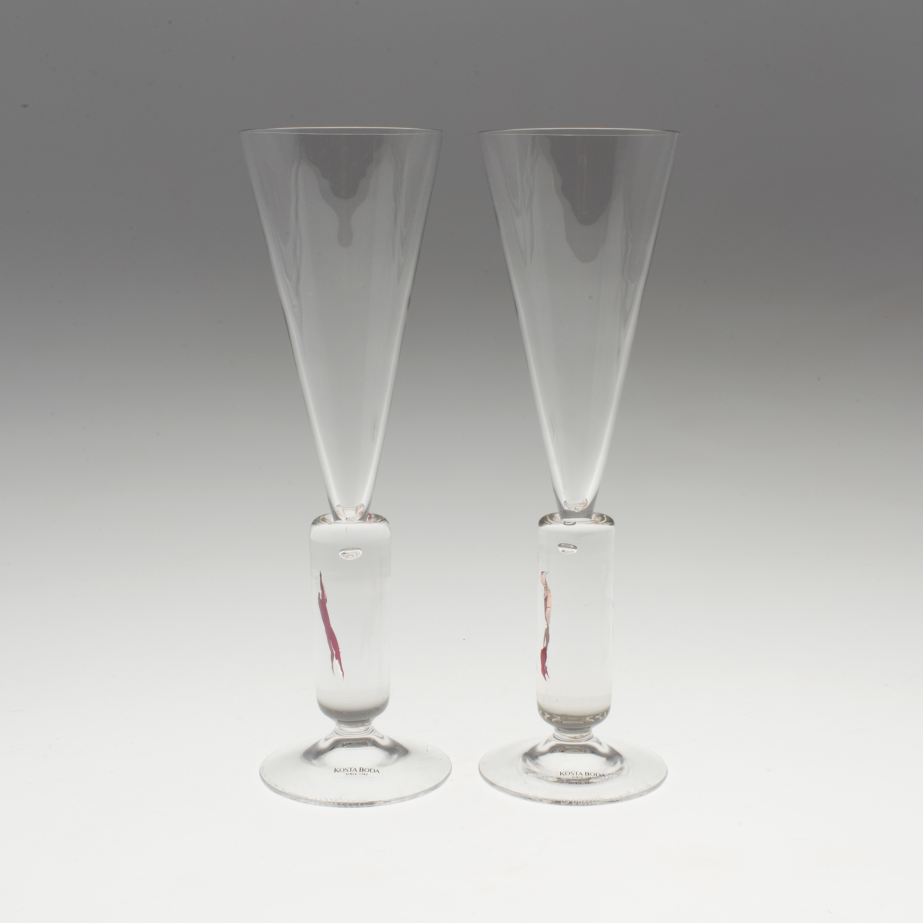 BERTIL VALLIEN, A pair of 'Millenium' glasses from Kosta Boda, 2000 ...