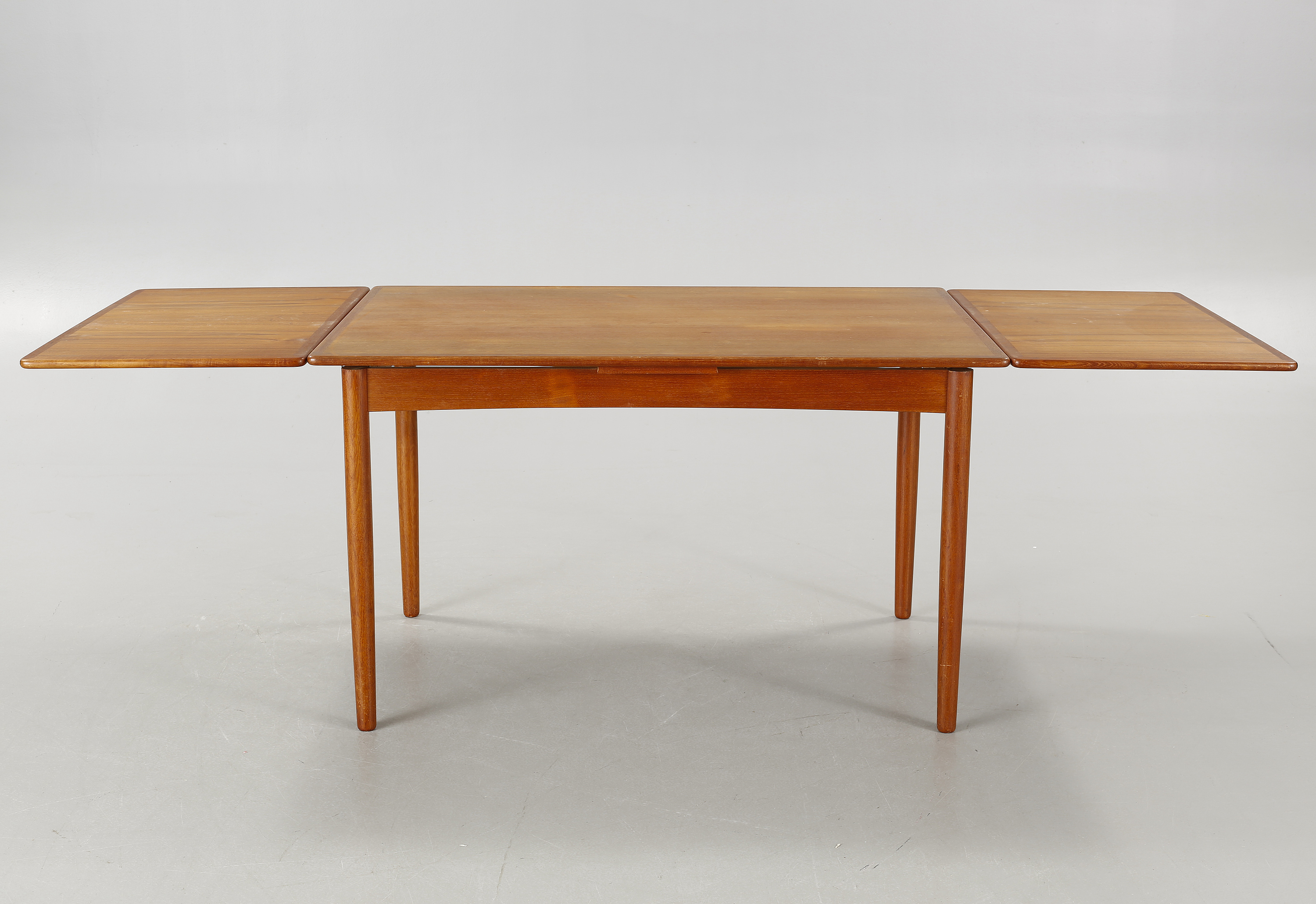 Eight chairs by Niels O Möller, model 75, and a dining table, not by ...