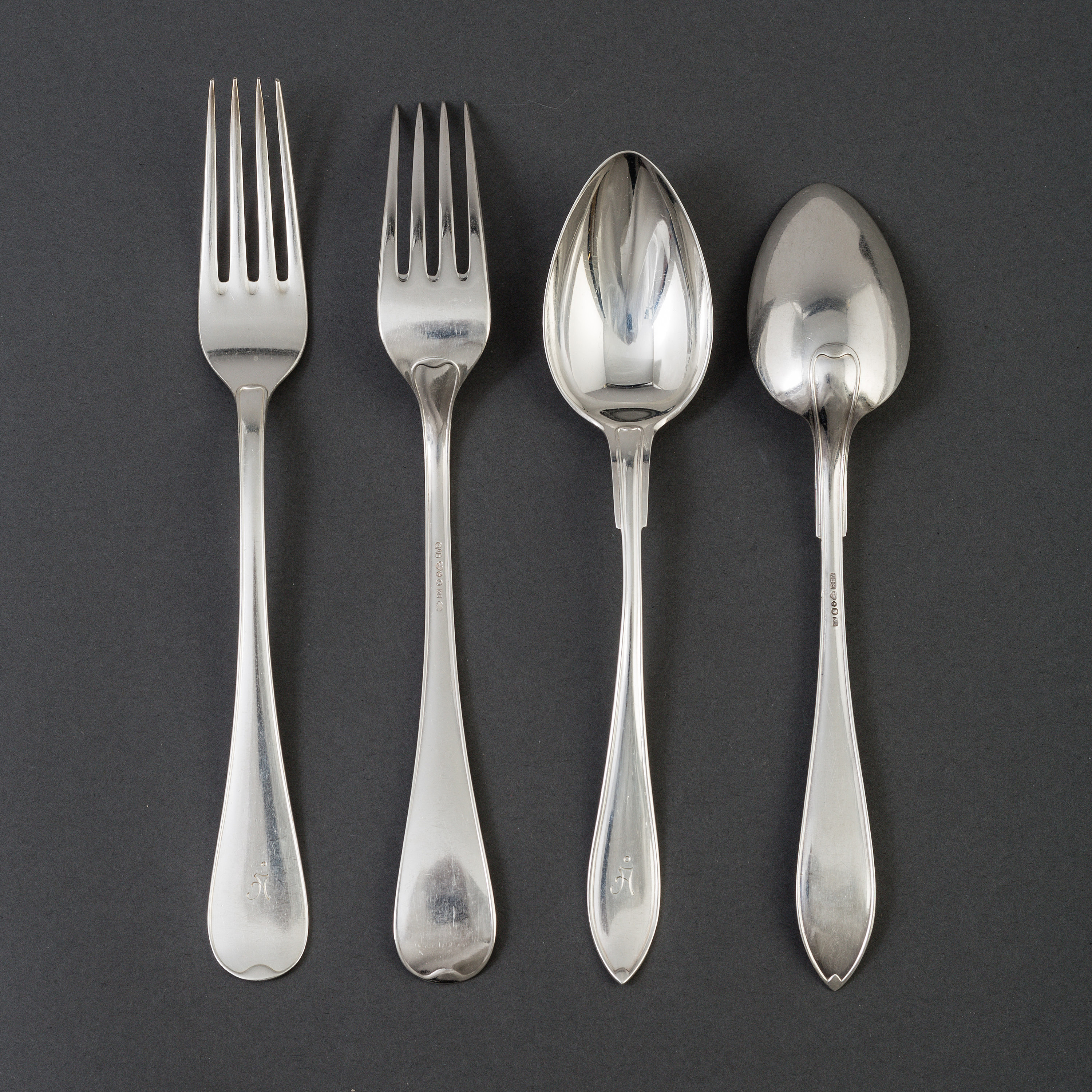 12 20th century silver spoons and 10 forks by GAB and Bernhard Hertz ...