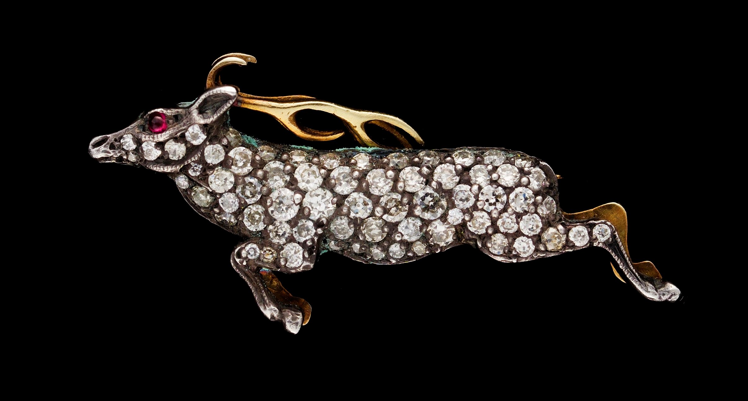 A gold and diamond stag brooch. - Bukowskis