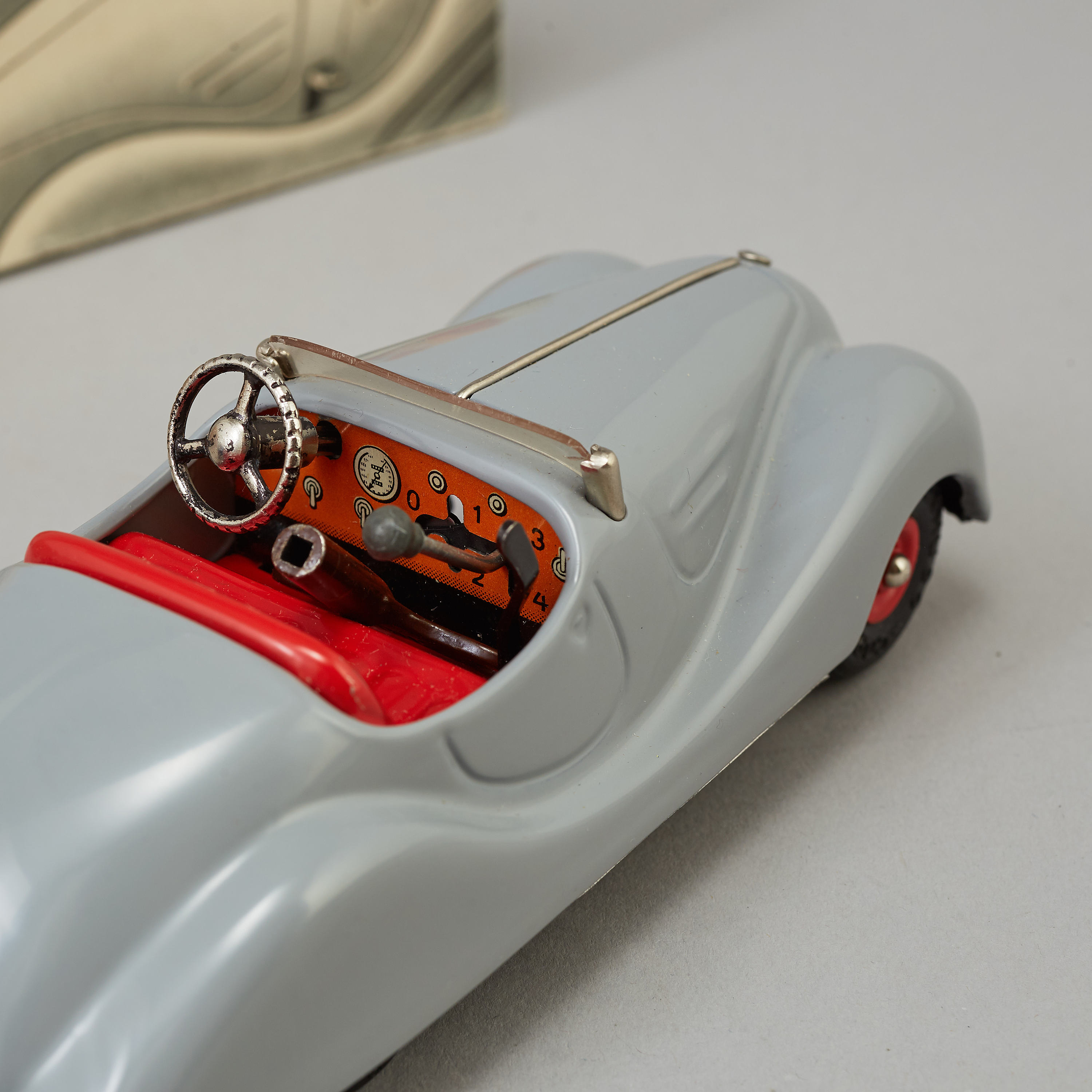 Two Schuco toy cars, Germany, mid 20th Century. - Bukowskis
