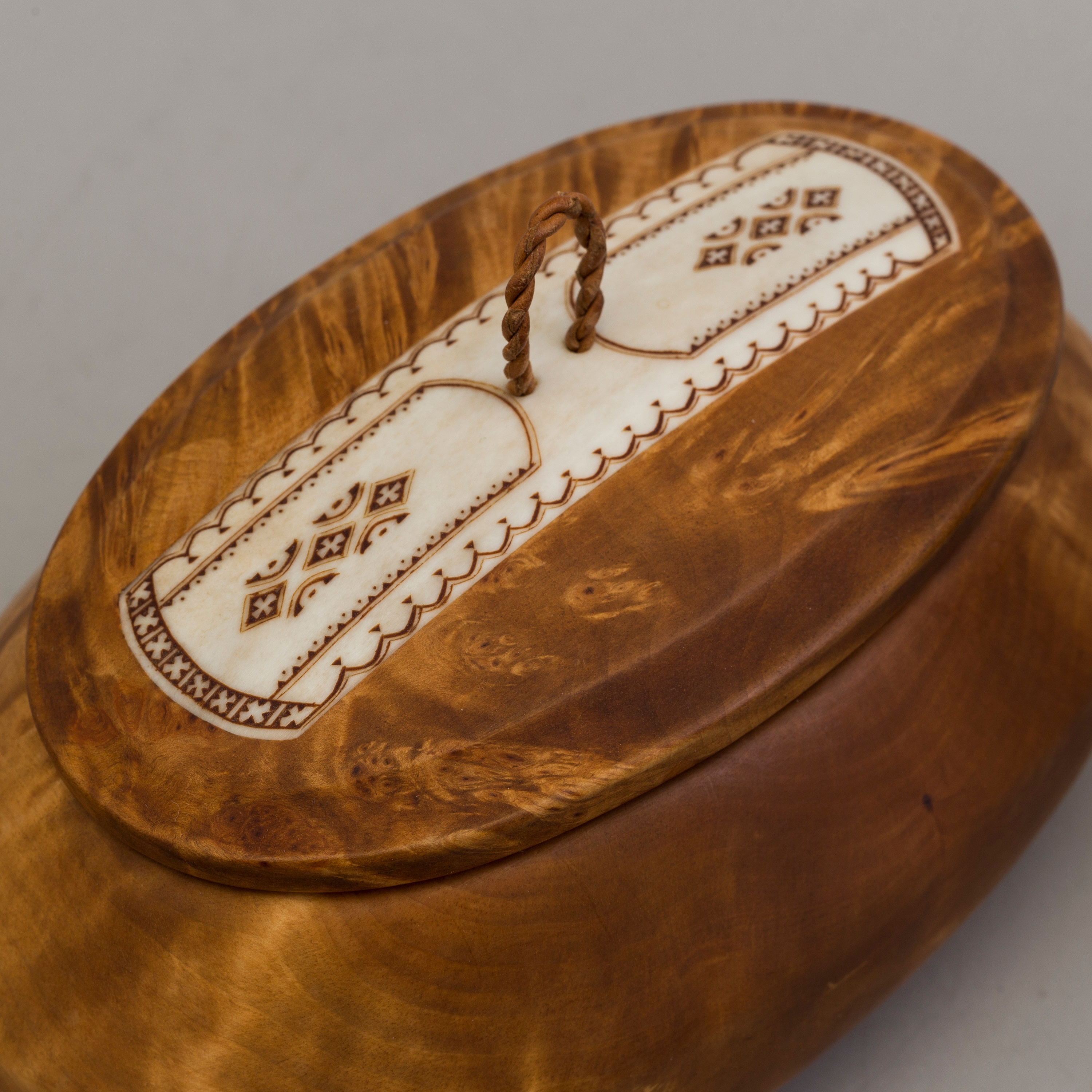 A 3 of 3 pieces of traditional sami items, sined. - Bukowskis