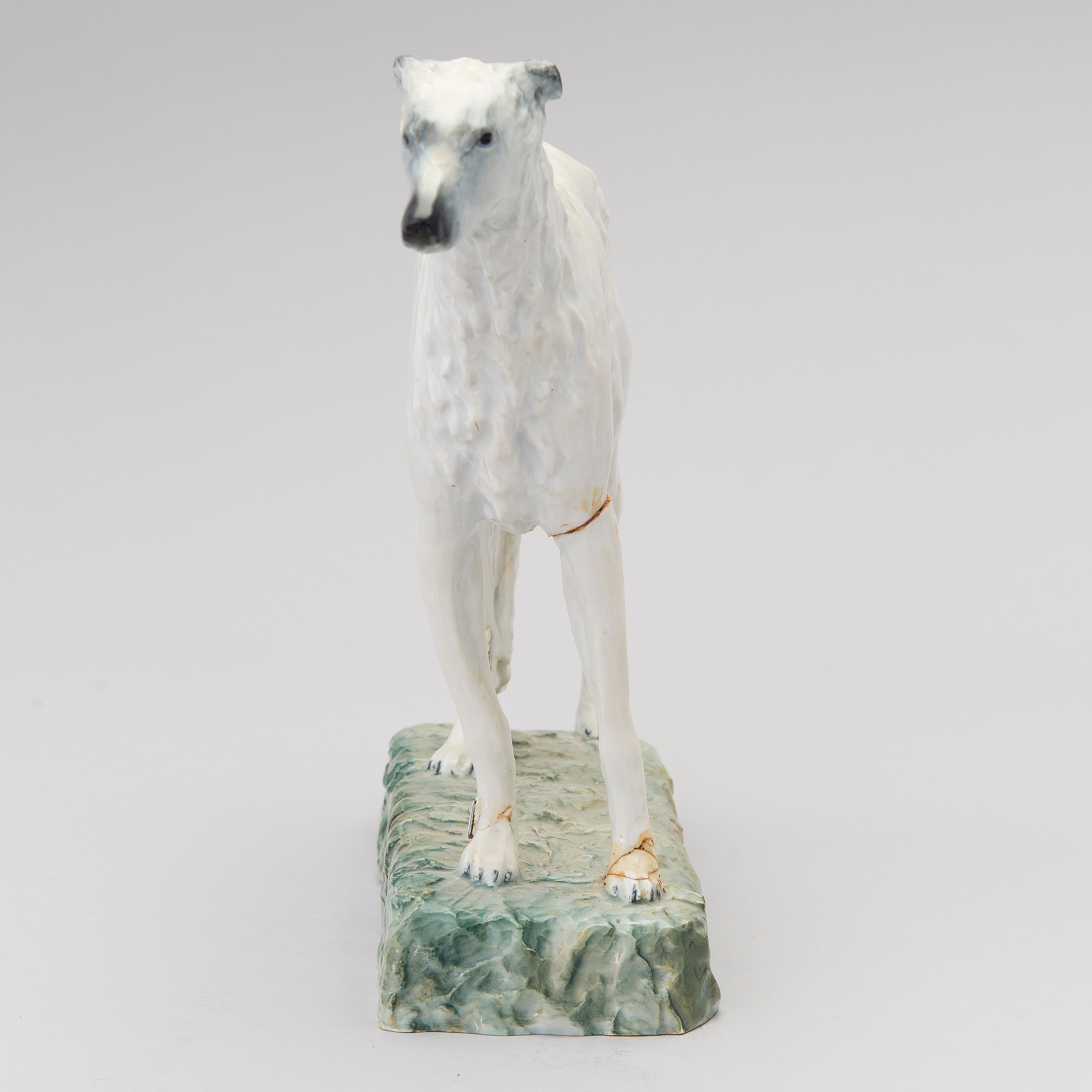 A porcelain borzoi figurine from Arabia Finland, signed and dated -30 ...