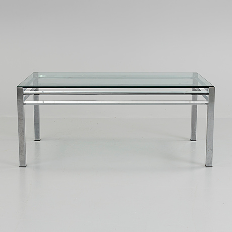 A 1980´s metal table with glass top. - Bukowskis
