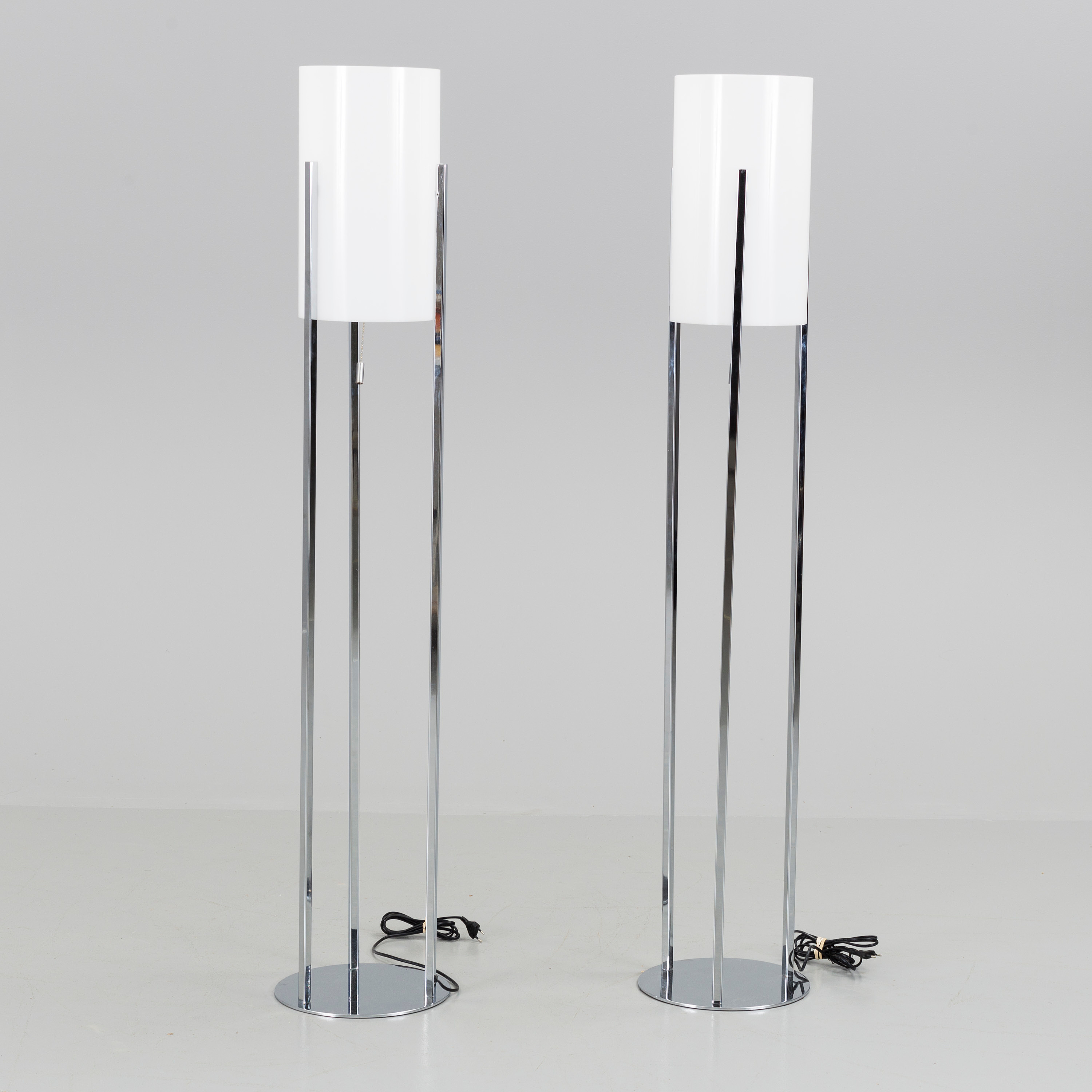 A pair of floor lamps by Scan Lamps. - Bukowskis