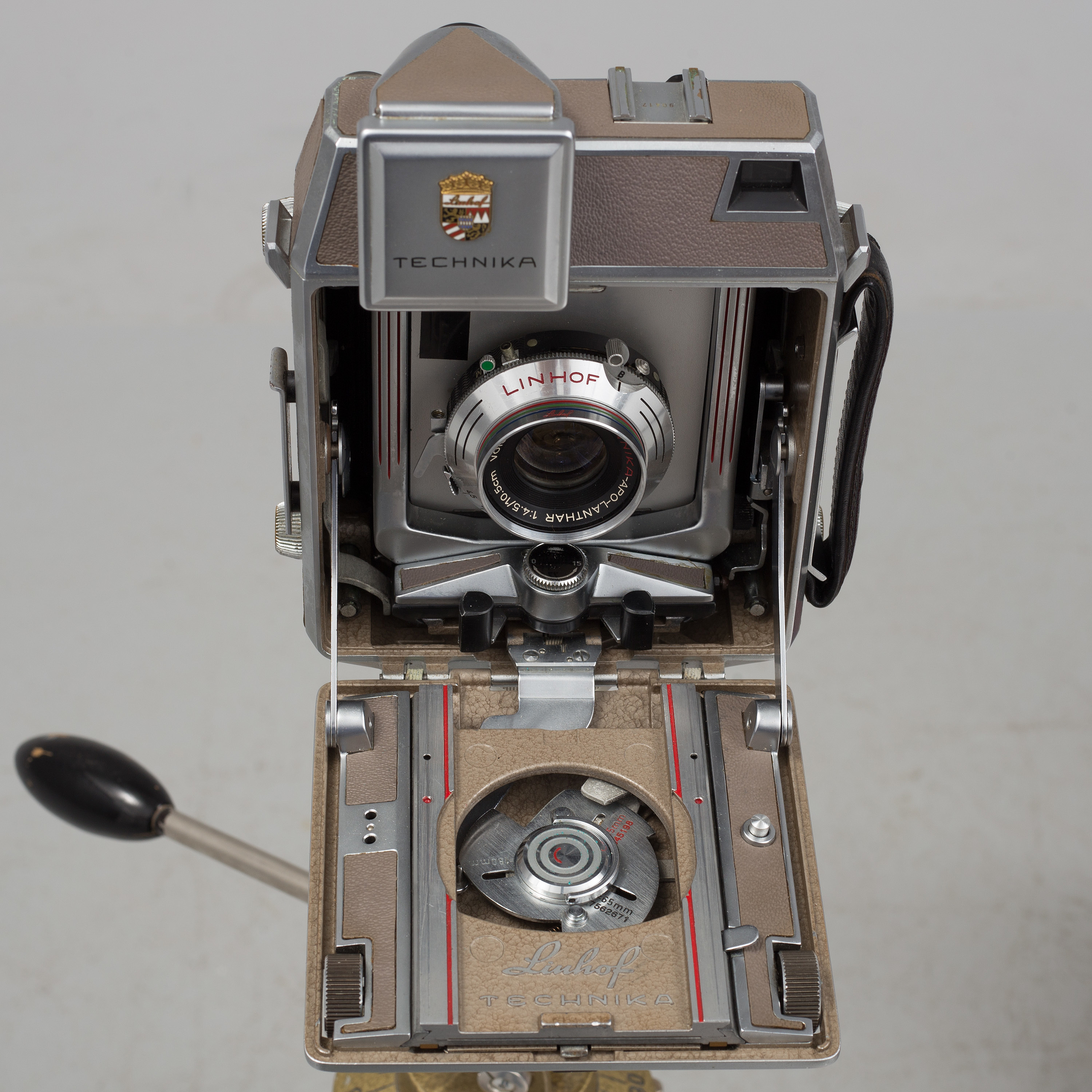 A Linhof Technika camera no 90417 with four lenses and one camera stand ...