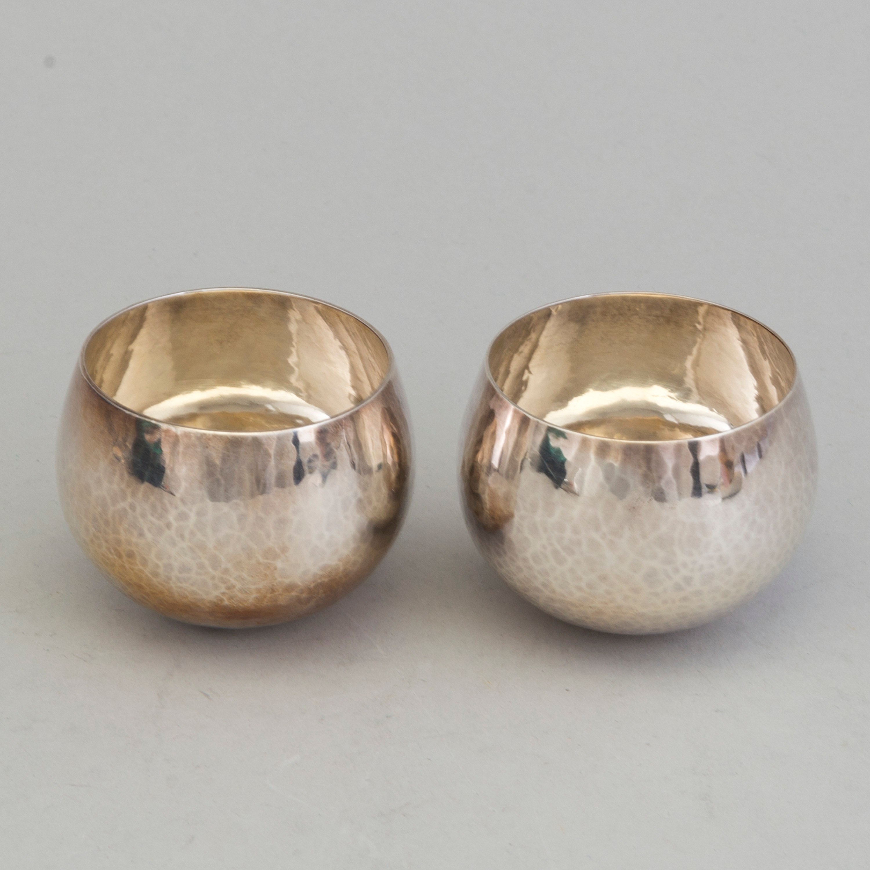 a pair of sterling silver cups by Karl-Axel Karlsson Stockholm 1989 ...