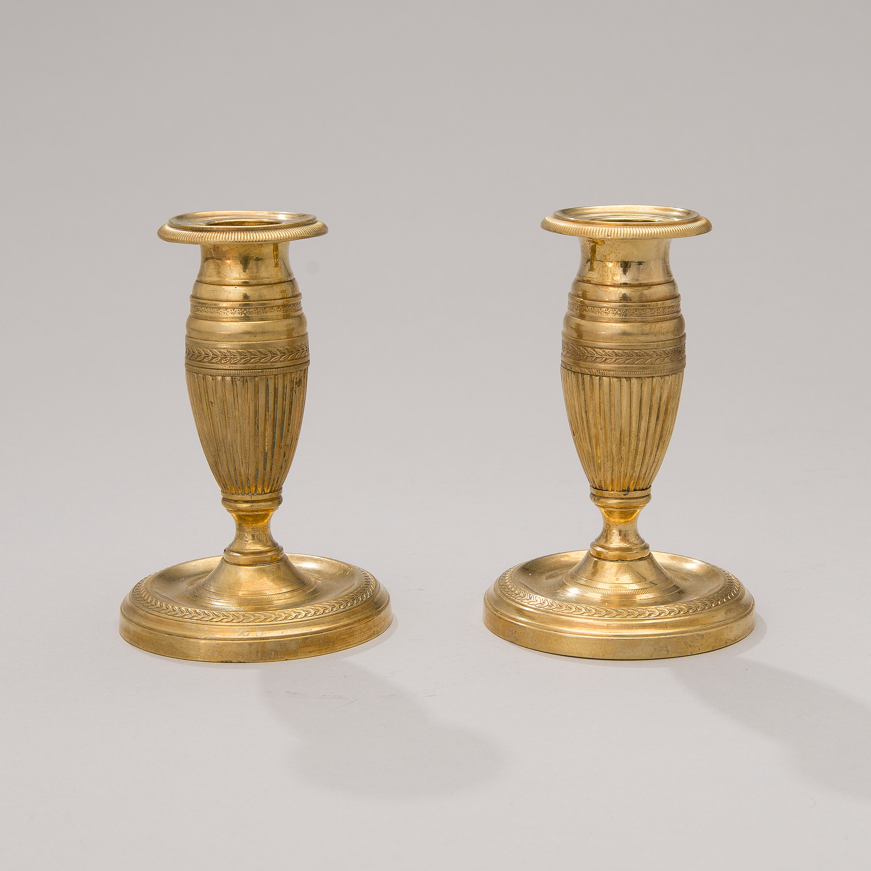 A pair of early 19th century Empire candle holders, France. - Bukowskis