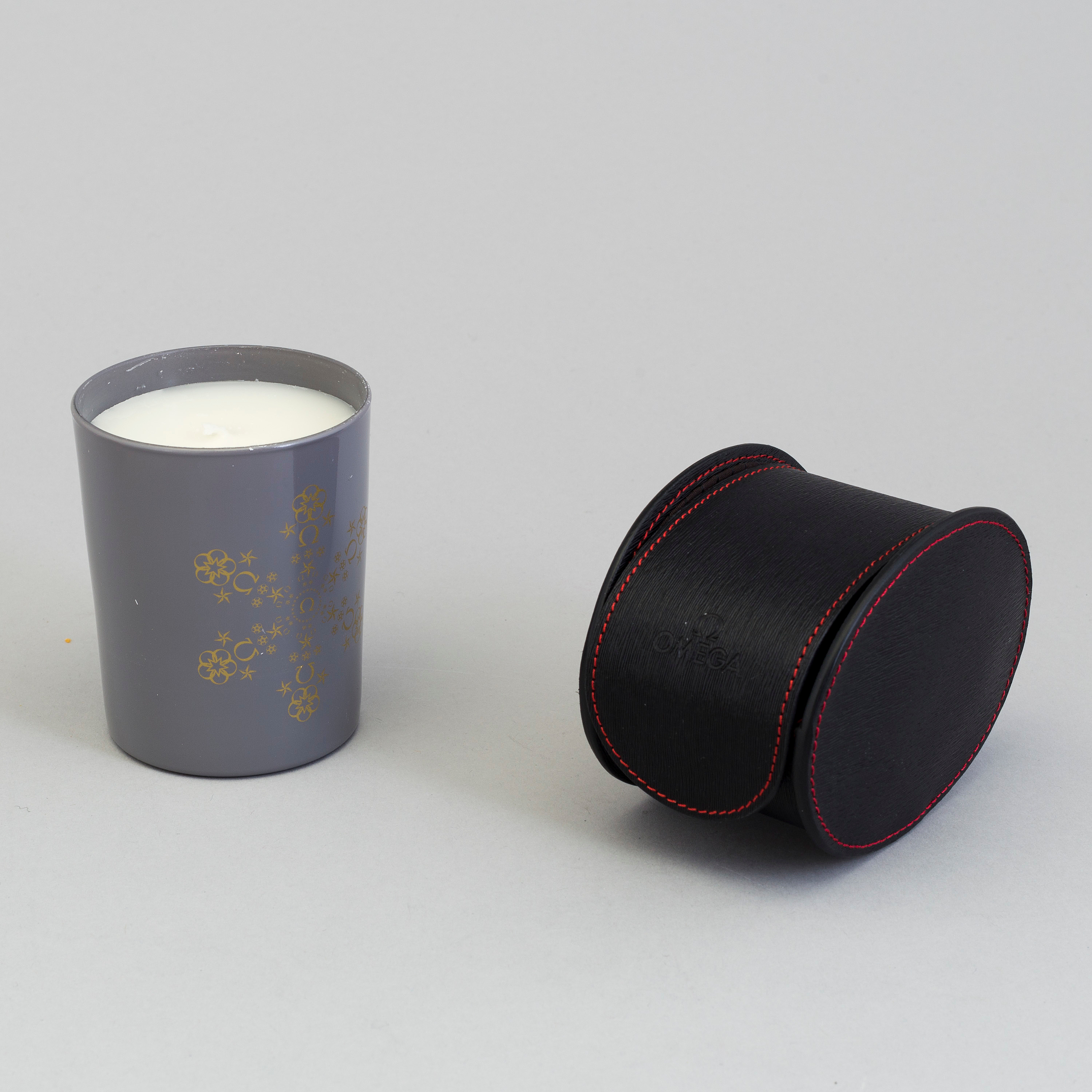 OMEGA, Watch case / Candle. - Bukowskis