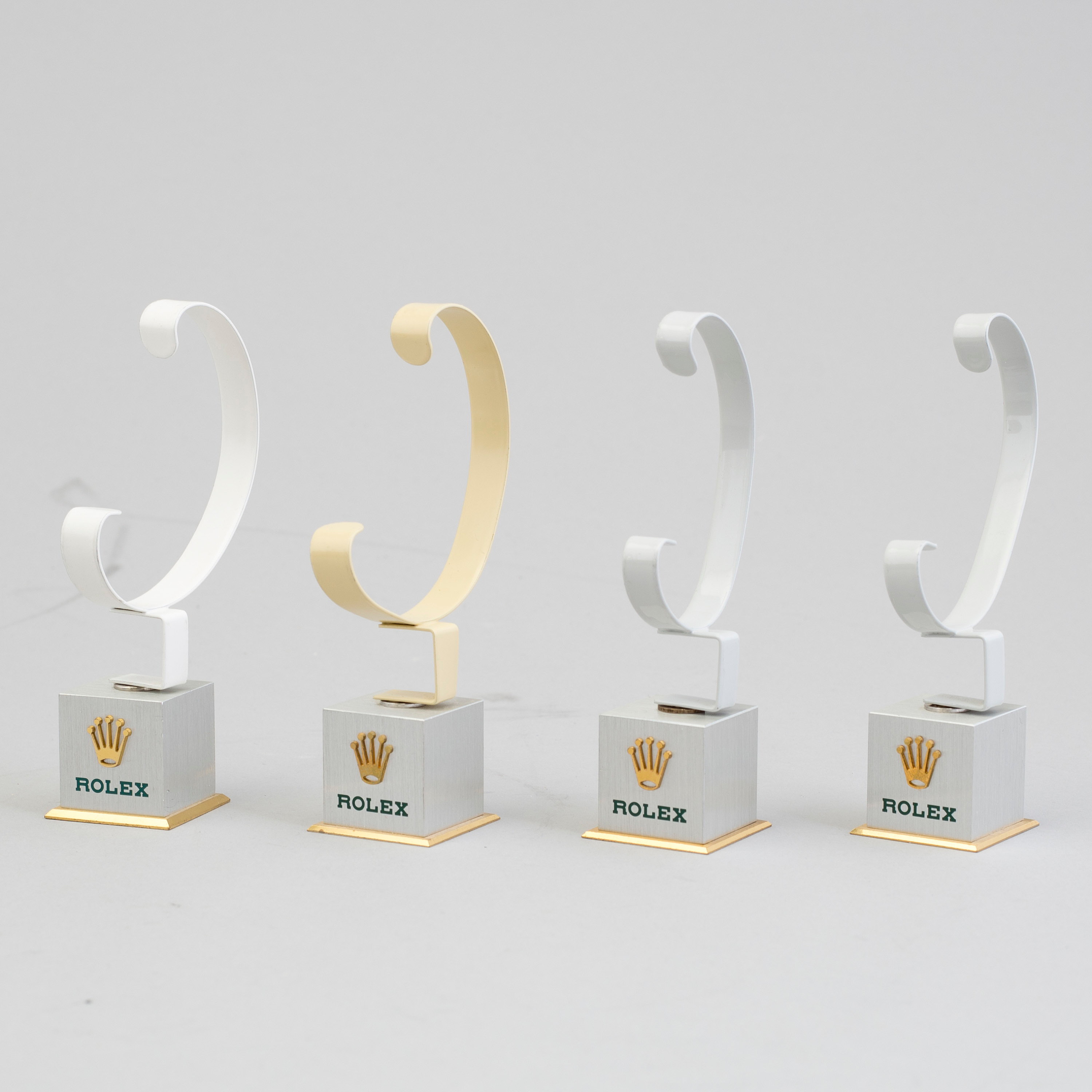 Rolex, Four watch display stands. - Bukowskis